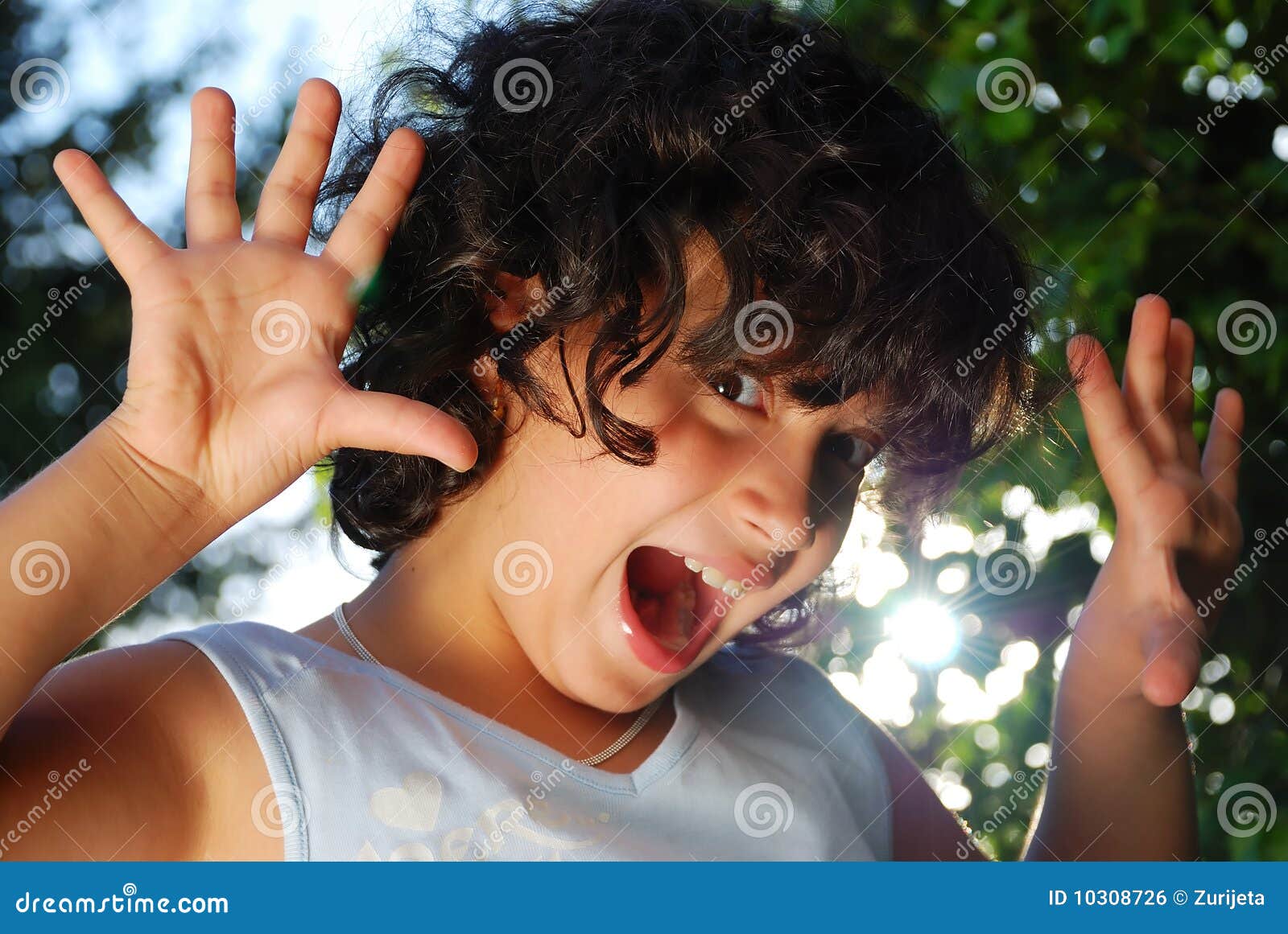 Girl screaming with hands stock photo. Image of lens - 10308726