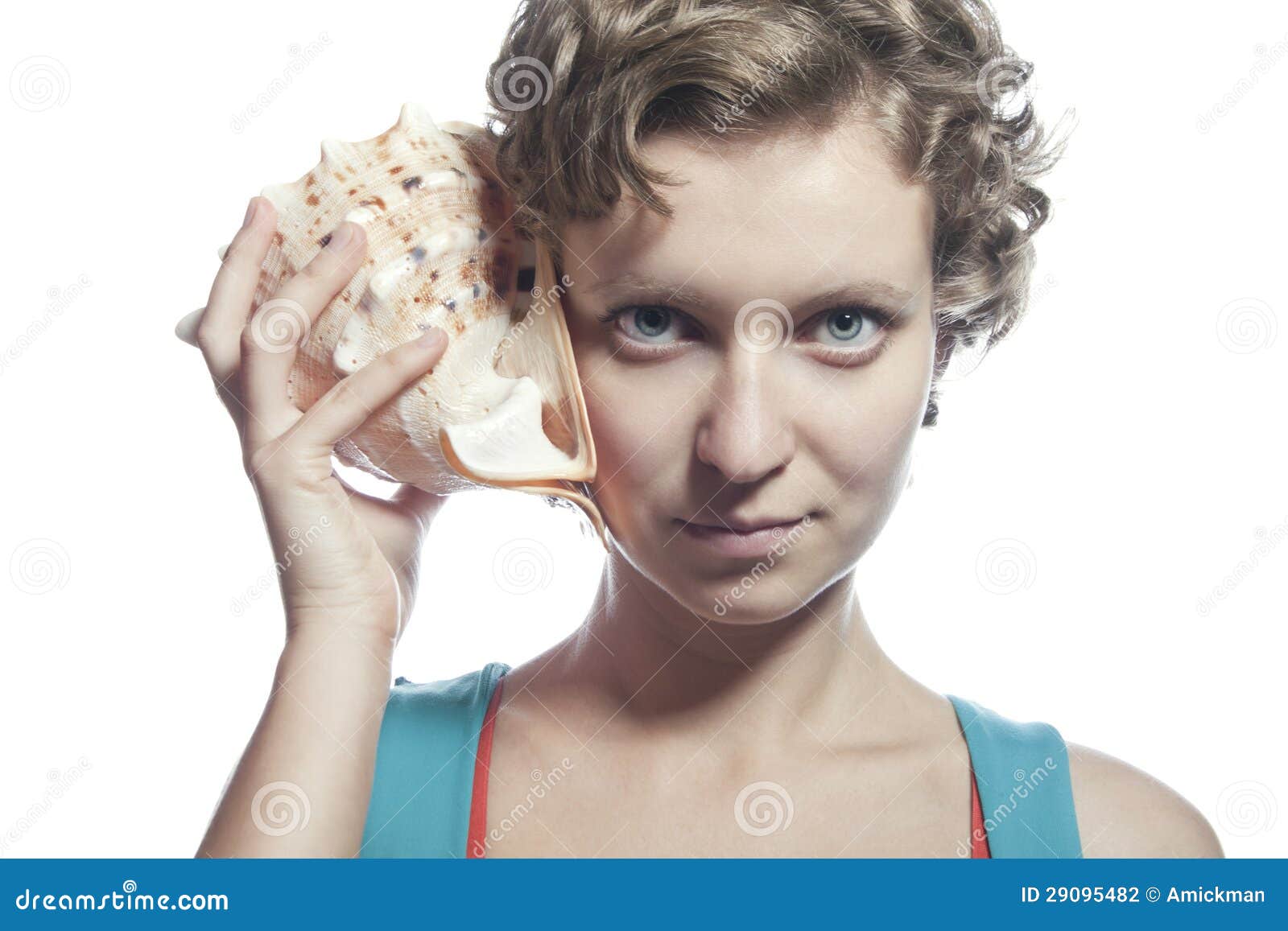 Girl with a Sea Shell To Your Ear Stock Photo - Image of person, woman ...