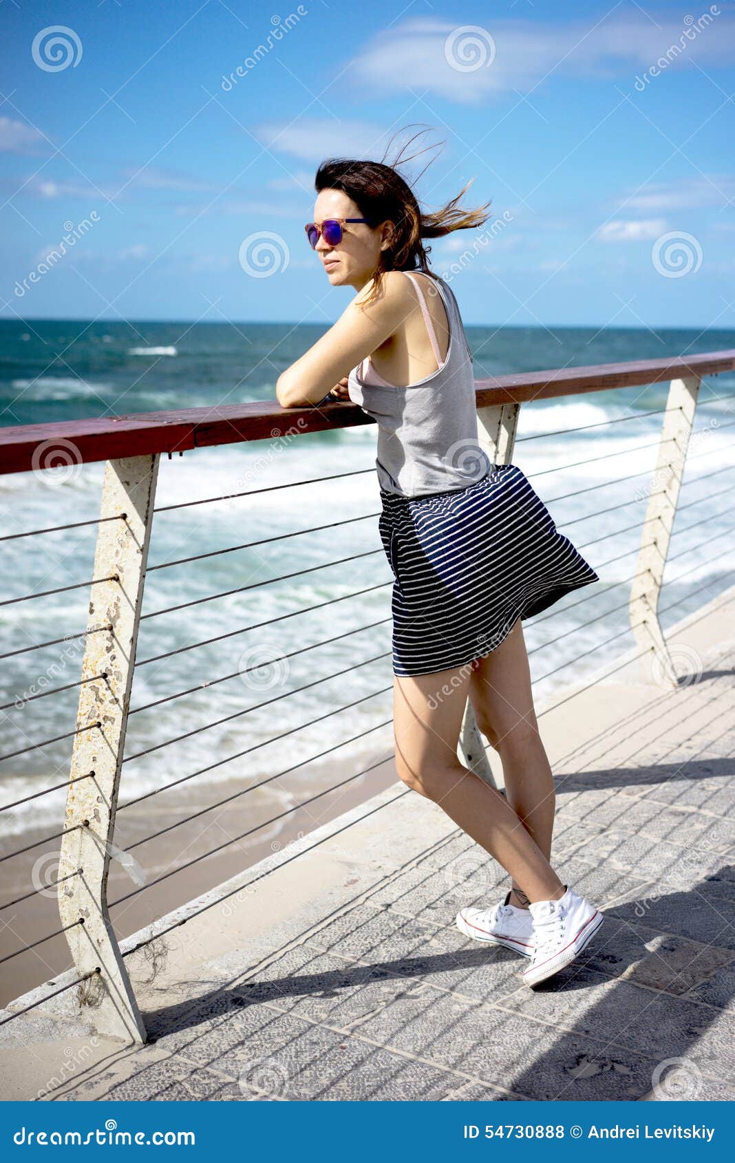Girl on the seafront stock photo. Image of beach, lifestyle - 54730888