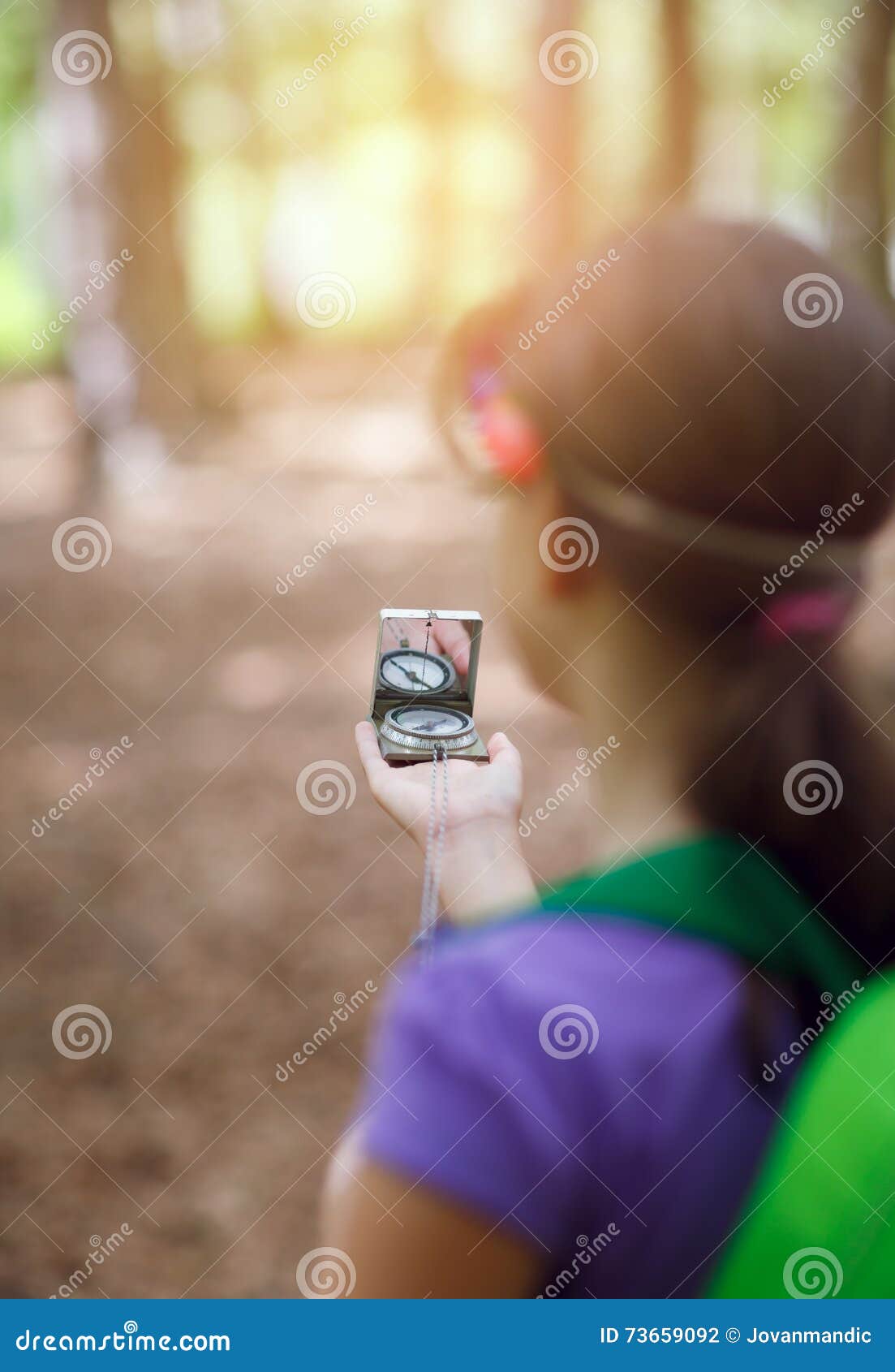 Girl Searching Direction with a Compass in the Forest Stock Photo ...