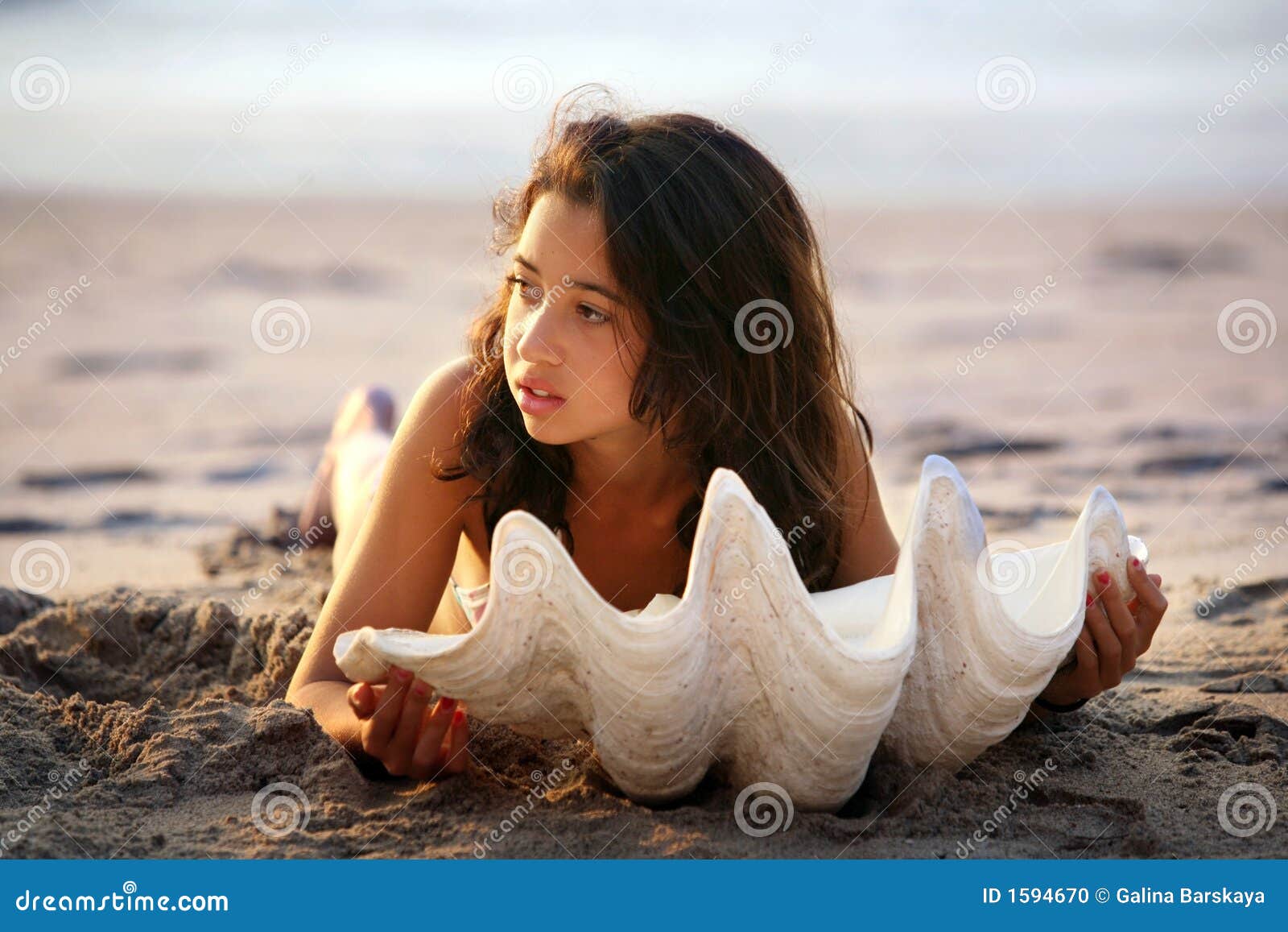 Girl with seashell stock photo. Image of peace, relax - 1594670
