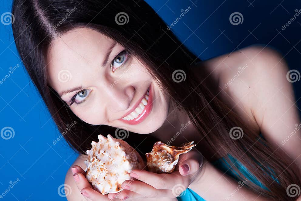 Girl with seashell stock photo. Image of nymph, brunette - 24673416
