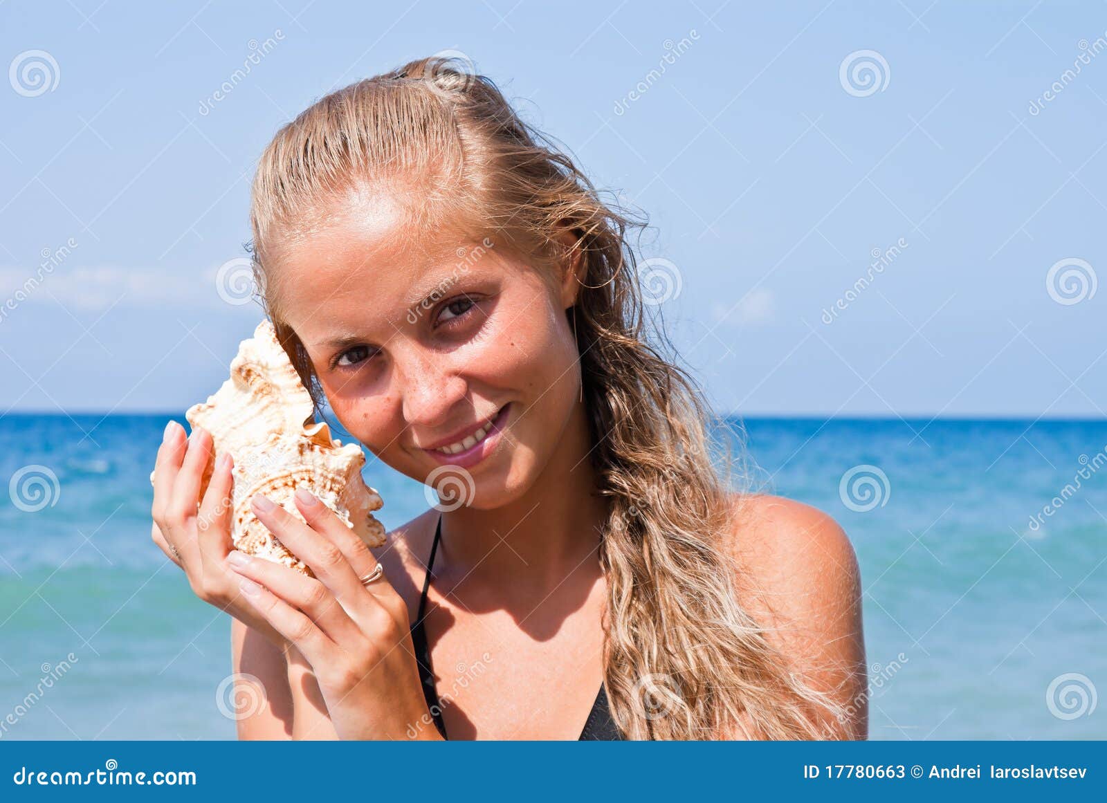 Girl with a Seashell on the Sea. Stock Image - Image of beach, sunshine ...