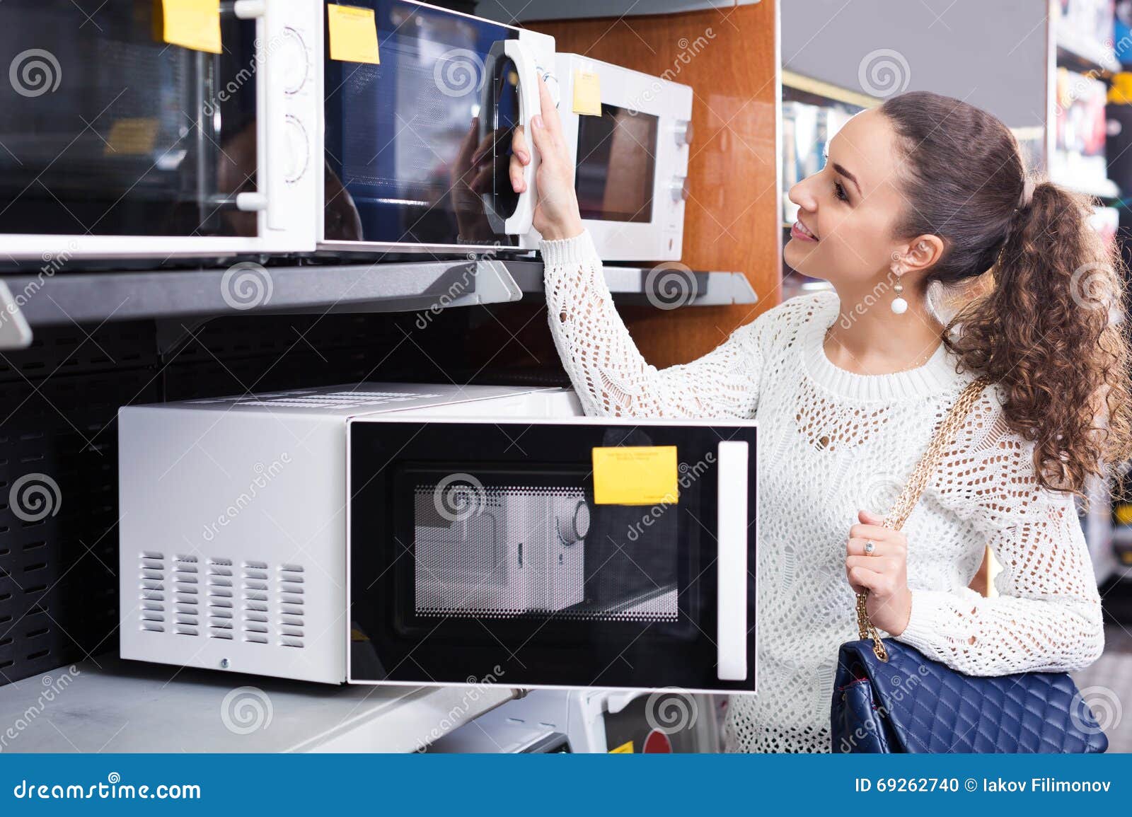 Girl Selecting Microwave Oven Stock Photo - Image of price, machinery ...