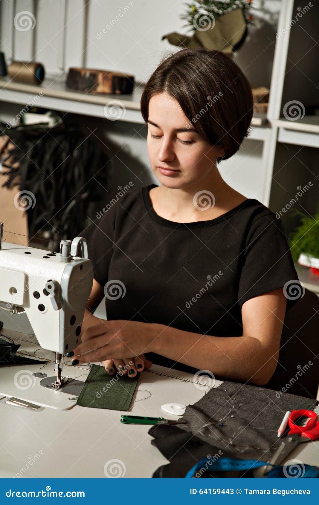 The Girl is Sewing on the Sewing Machine Stock Image - Image of ...