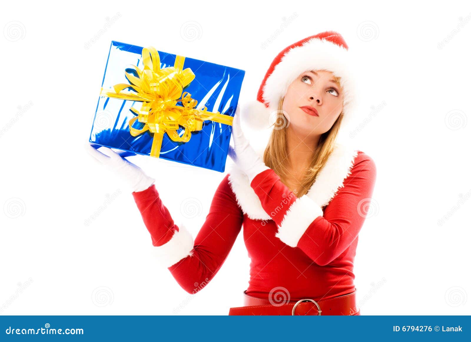 Girl Shaking a Box with a Christmas Present Stock Photo - Image of ...