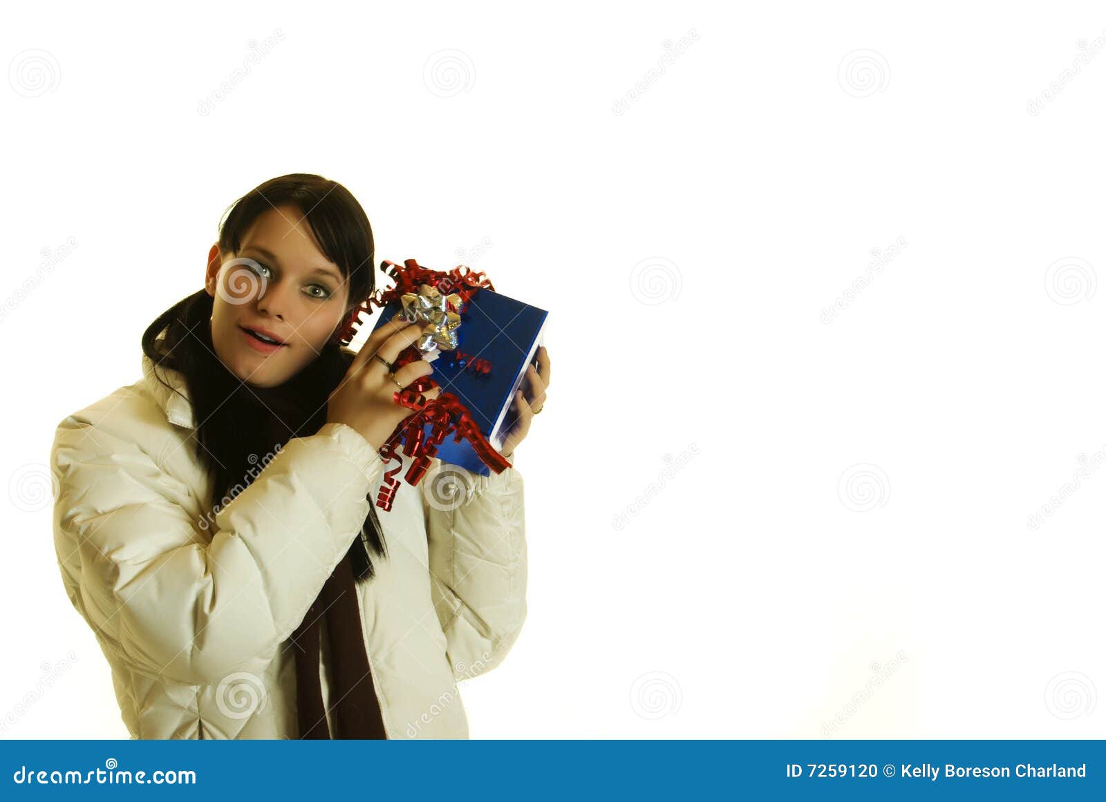 Girl shaking a gift stock photo. Image of cute, fresh - 7259120