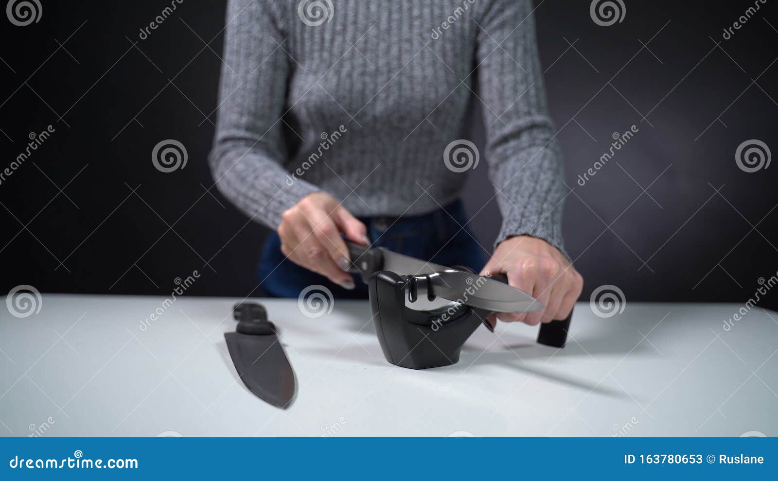 A Girl Sharpens a Knife with a Sharpener Stock Video - Video of craft ...