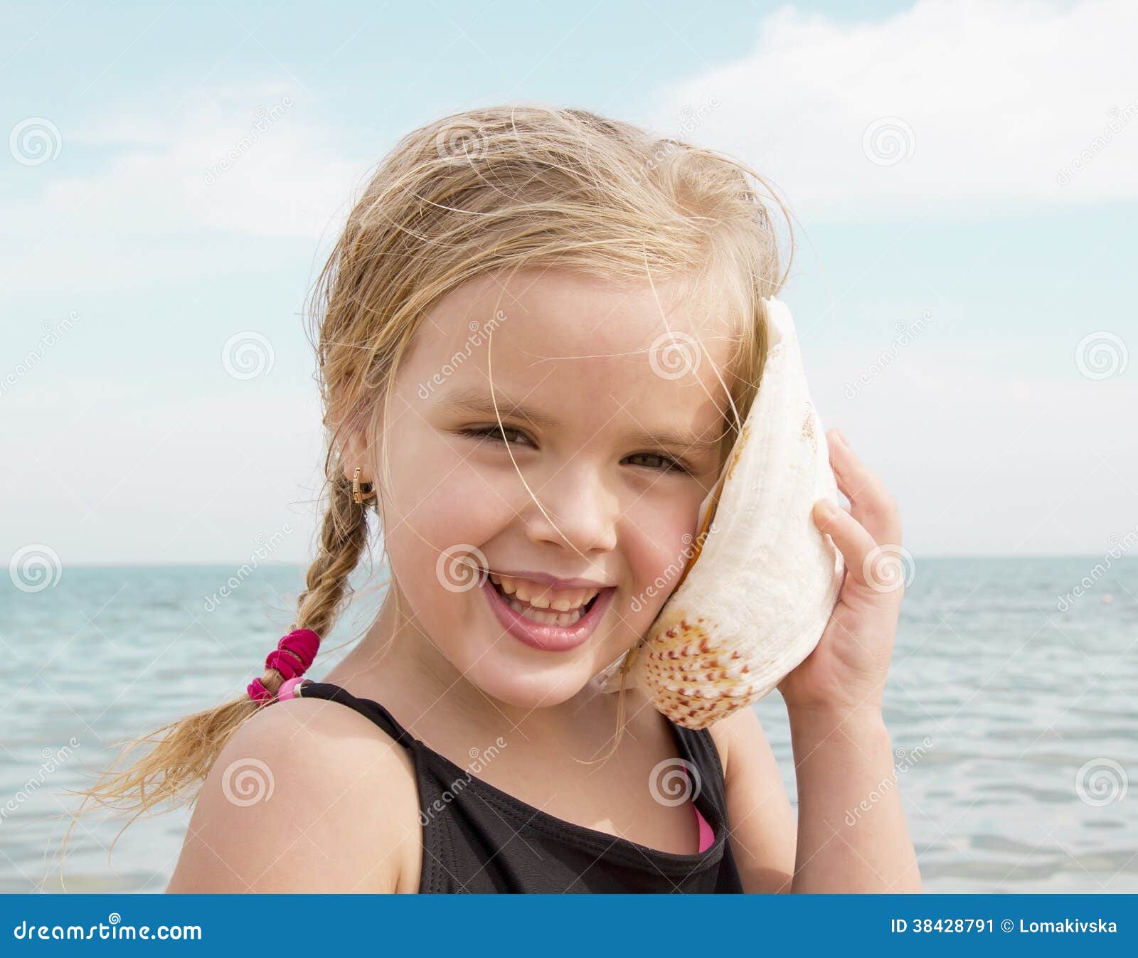 Girl with Shell Listening To the Sea Stock Image - Image of listening ...