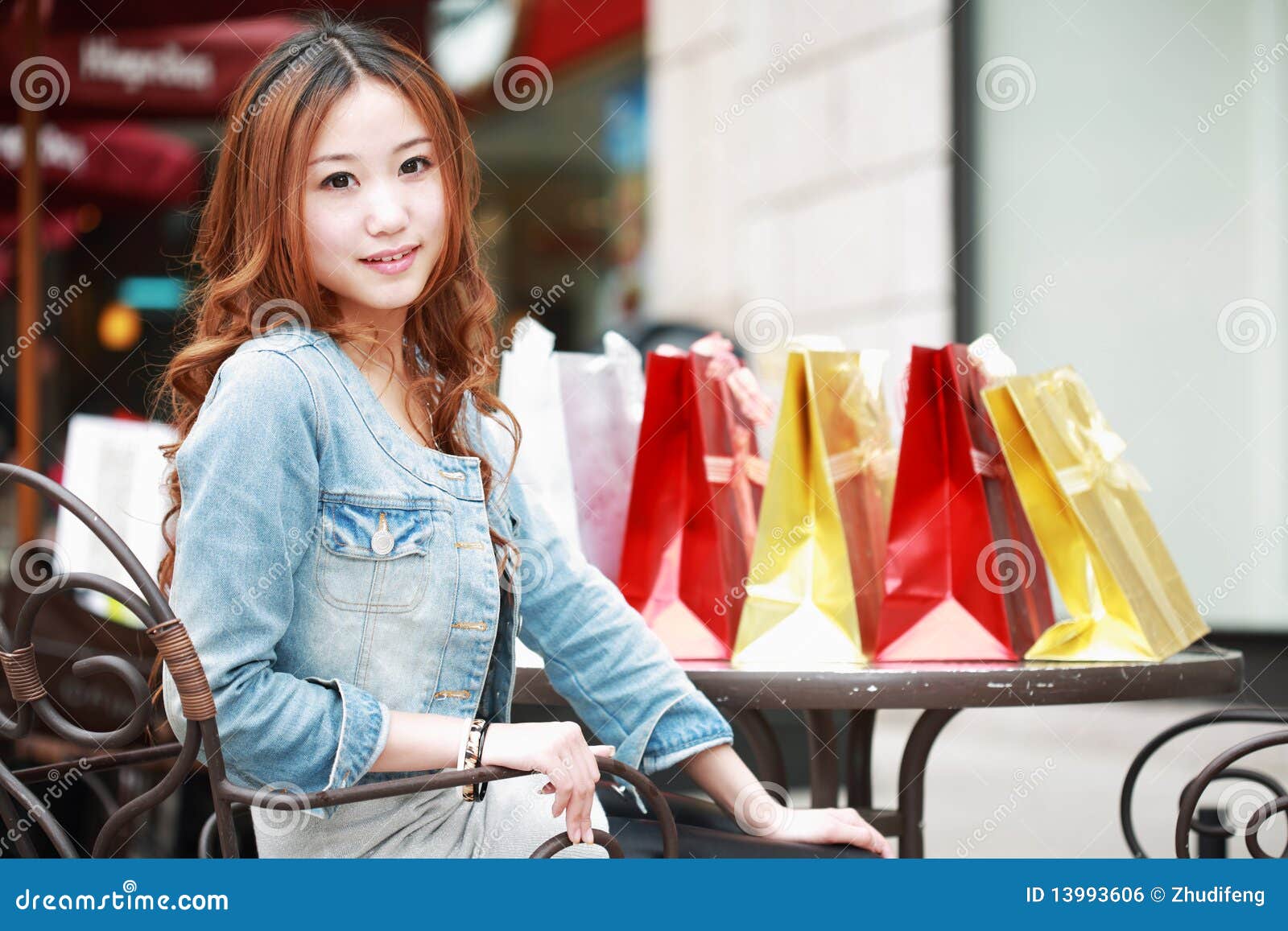 Girl with shopping bags stock photo. Image of cheerful - 13993606