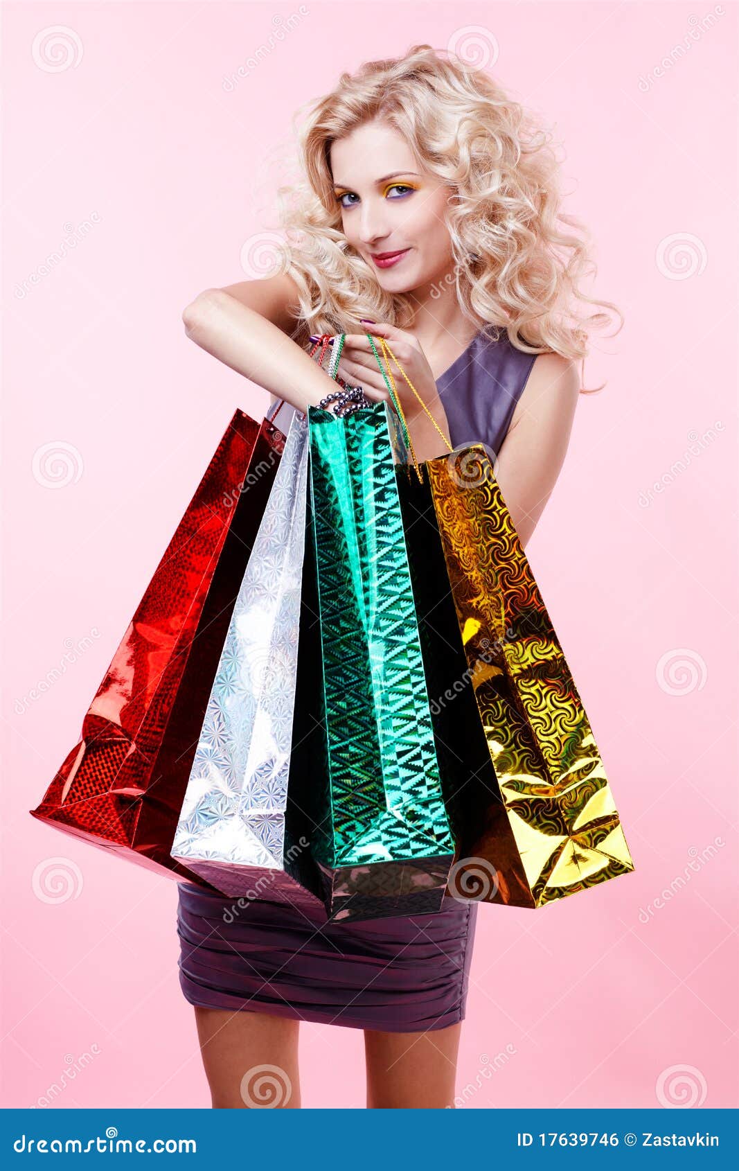 Girl with shopping bags stock photo. Image of gift, holding - 17639746