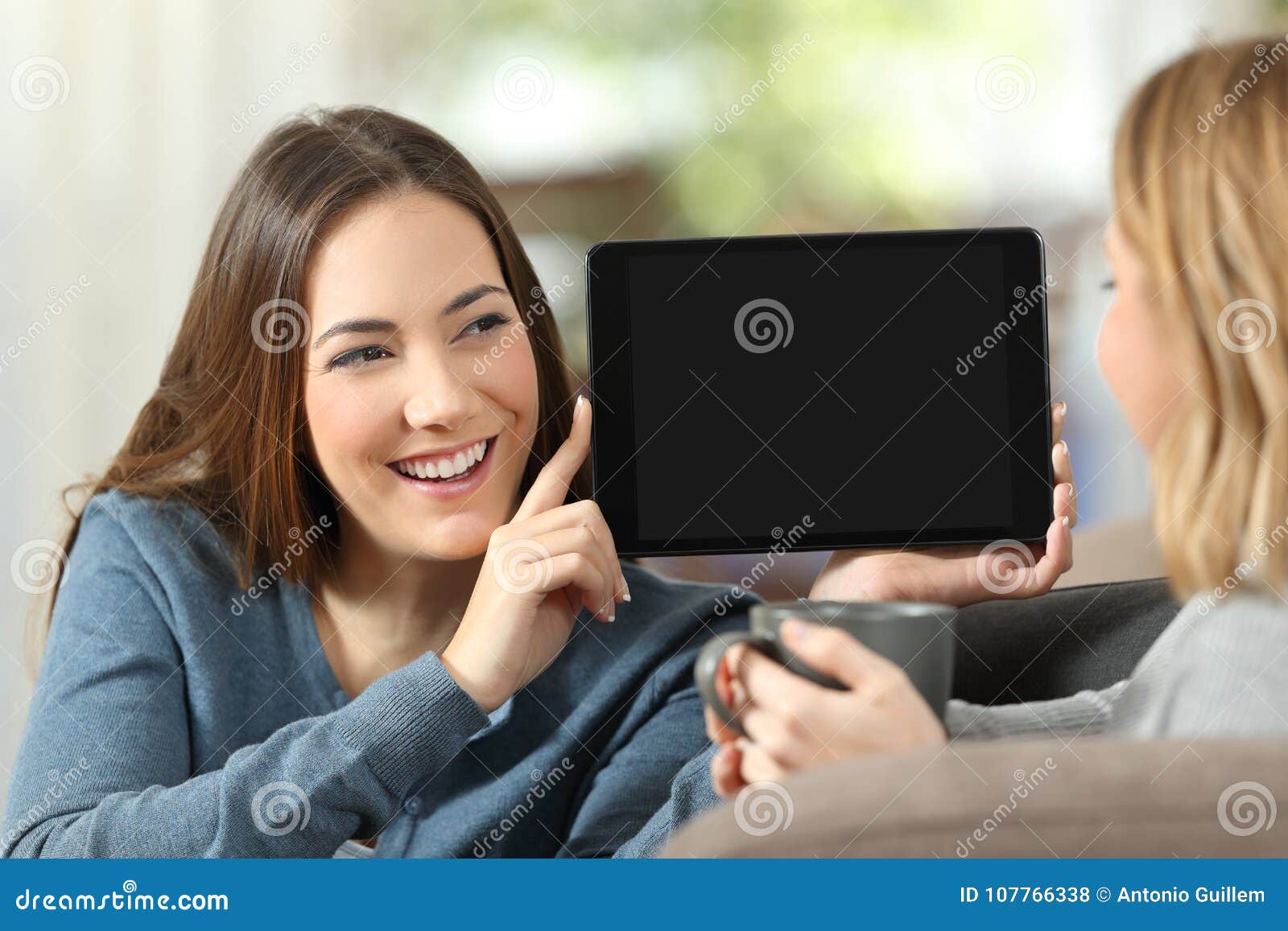 Girl Showing a Blank Tablet Screen To a Friend Stock Photo - Image of ... Girl Showing a Blank Tablet Screen To a Friend Stock Photo - Image of ...