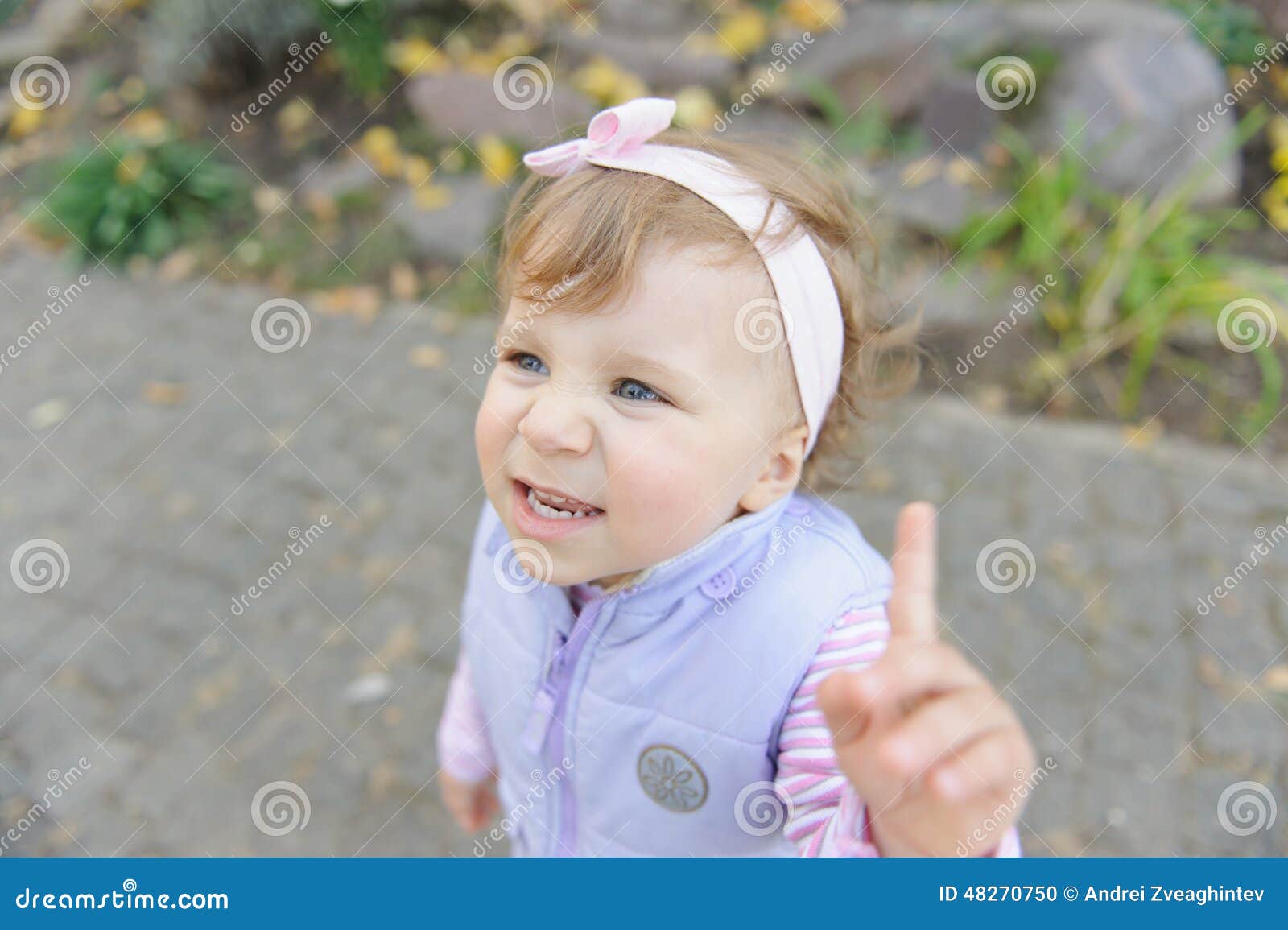 Girl SHowing Forefinger stock photo. Image of beauty - 48270750