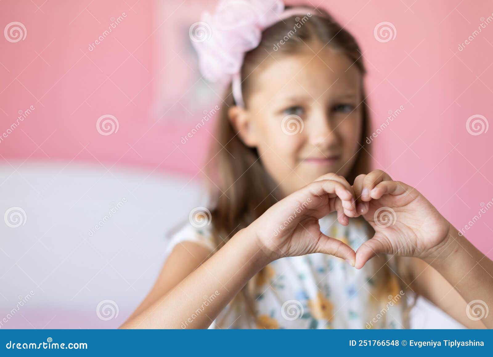 Girl showing a heart stock photo. Image of young, hand - 251766548
