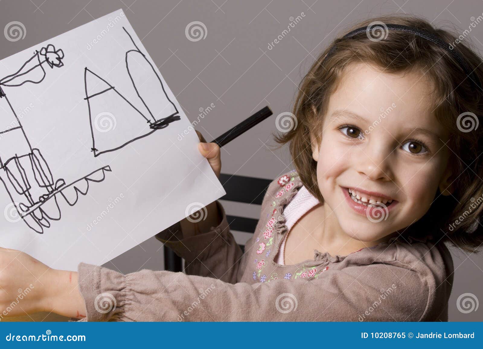 Girl showing her drawing stock image. Image of childhood - 10208765