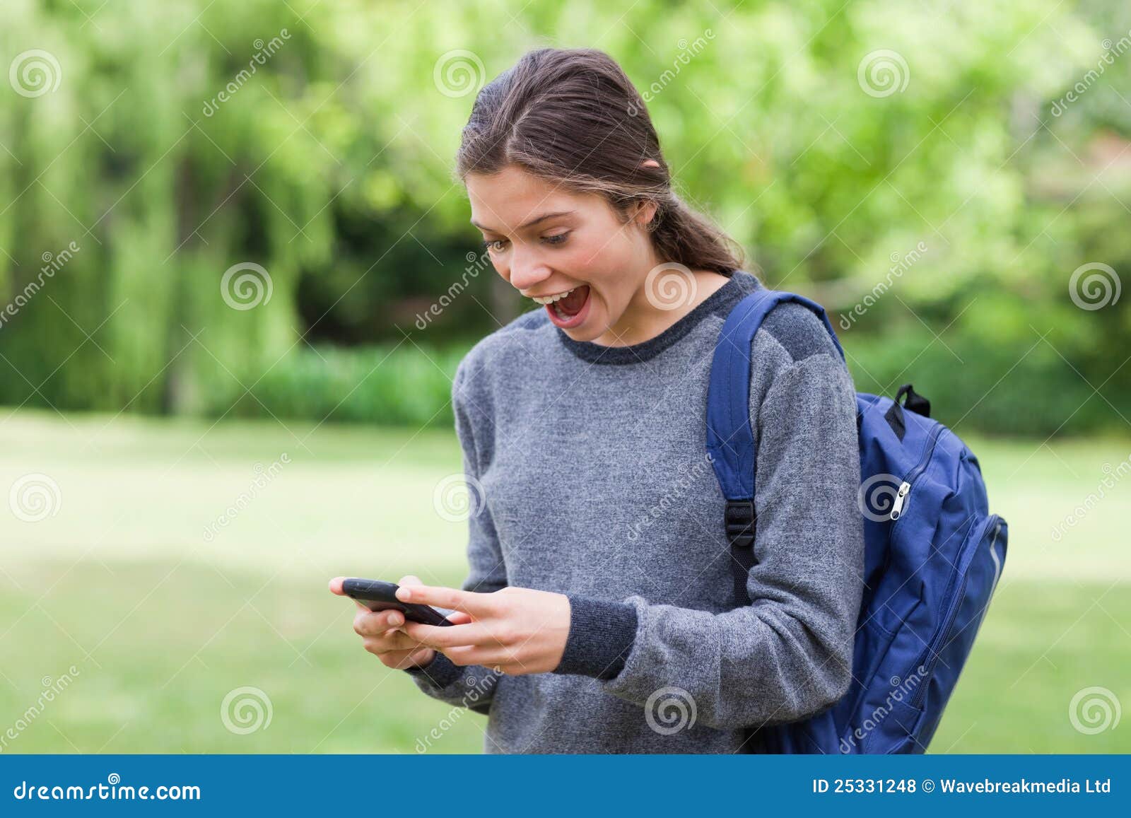 Girl Showing Her Surprise after Receiving a Text Stock Photo - Image of ...