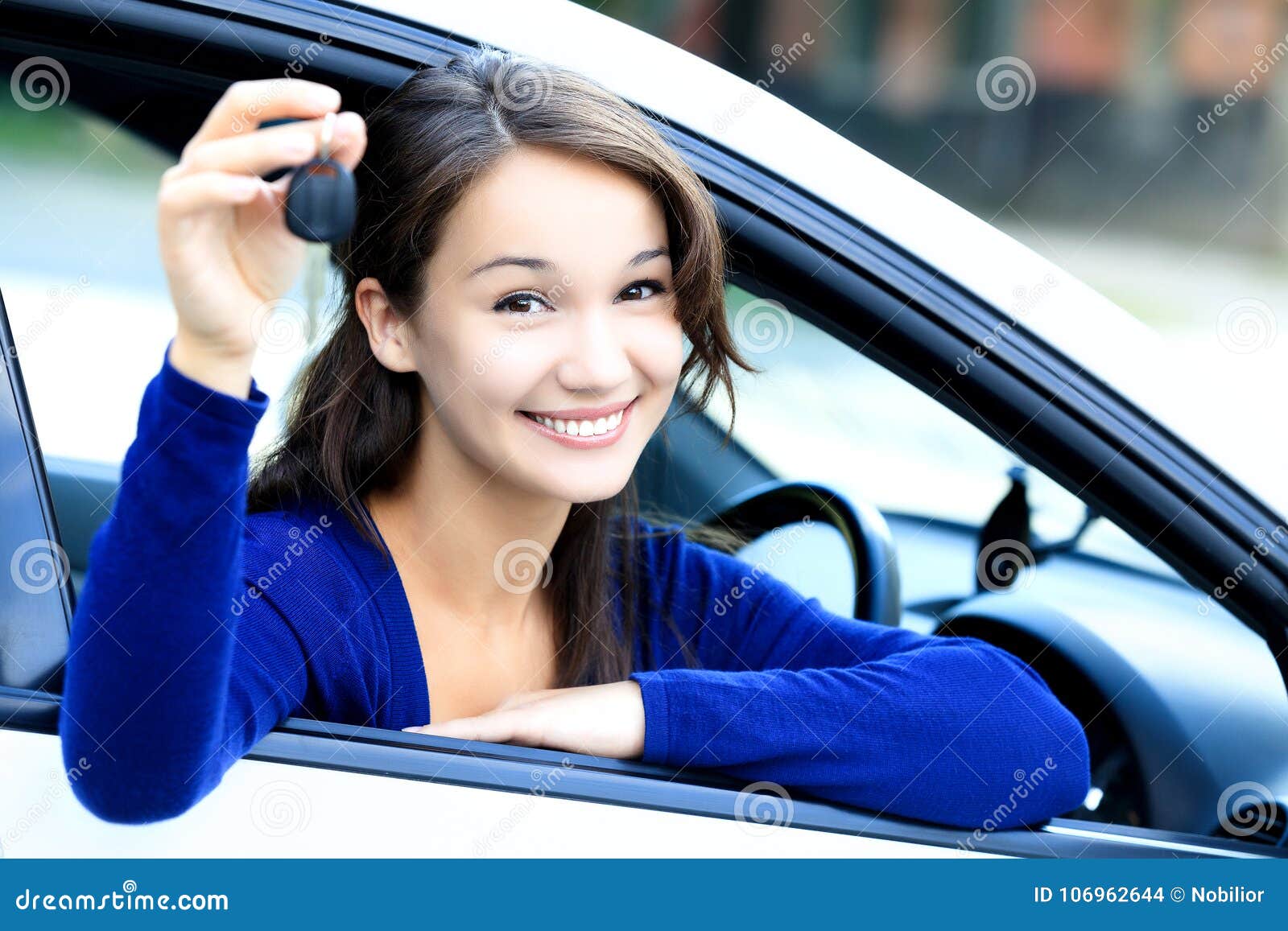 Girl shows a car key stock photo. Image of happiness - 106962644
