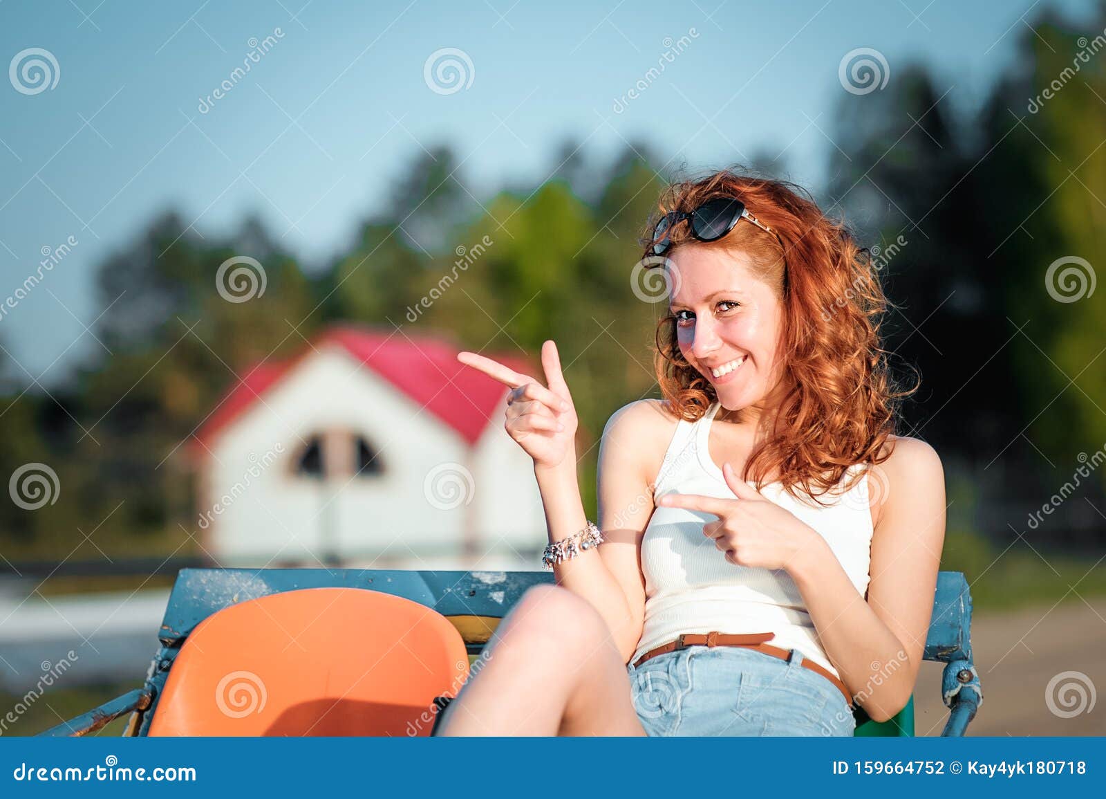 Girl Shows Direction with Hand. the Girl Shows a Direction Stock Photo ...