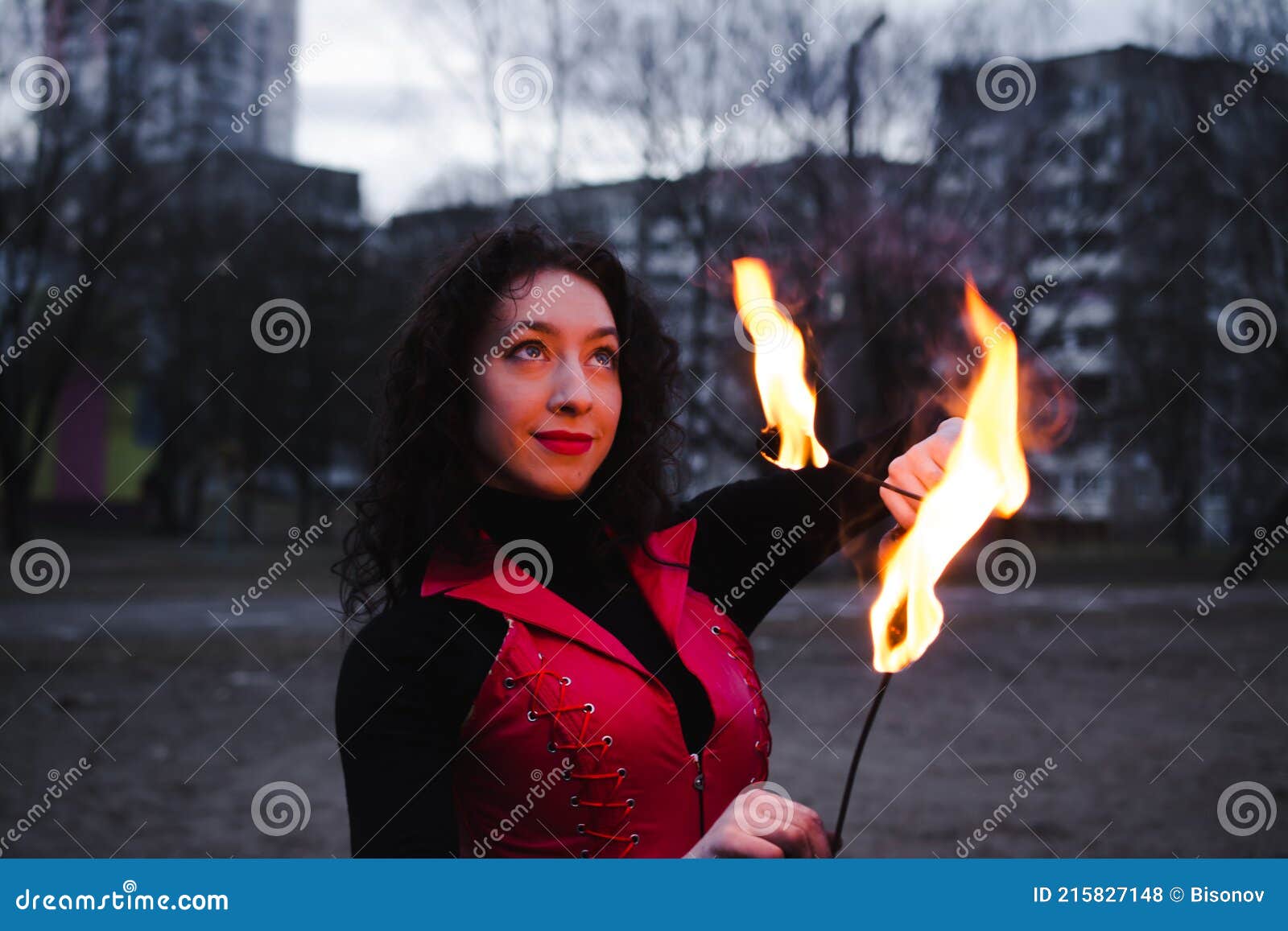 A girl shows a fire show stock photo. Image of glowing - 215827148