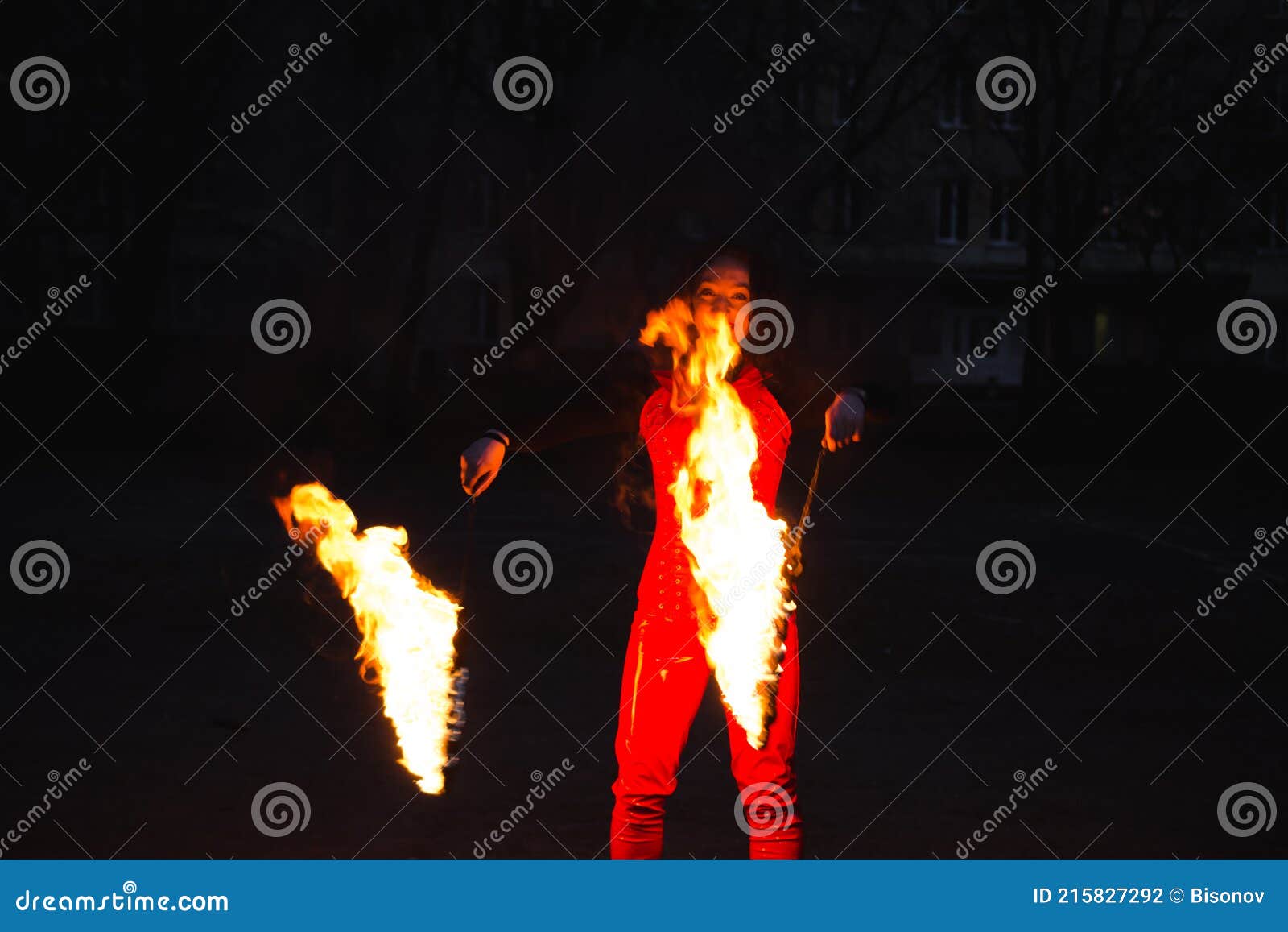 A girl shows a fire show stock photo. Image of light - 215827292