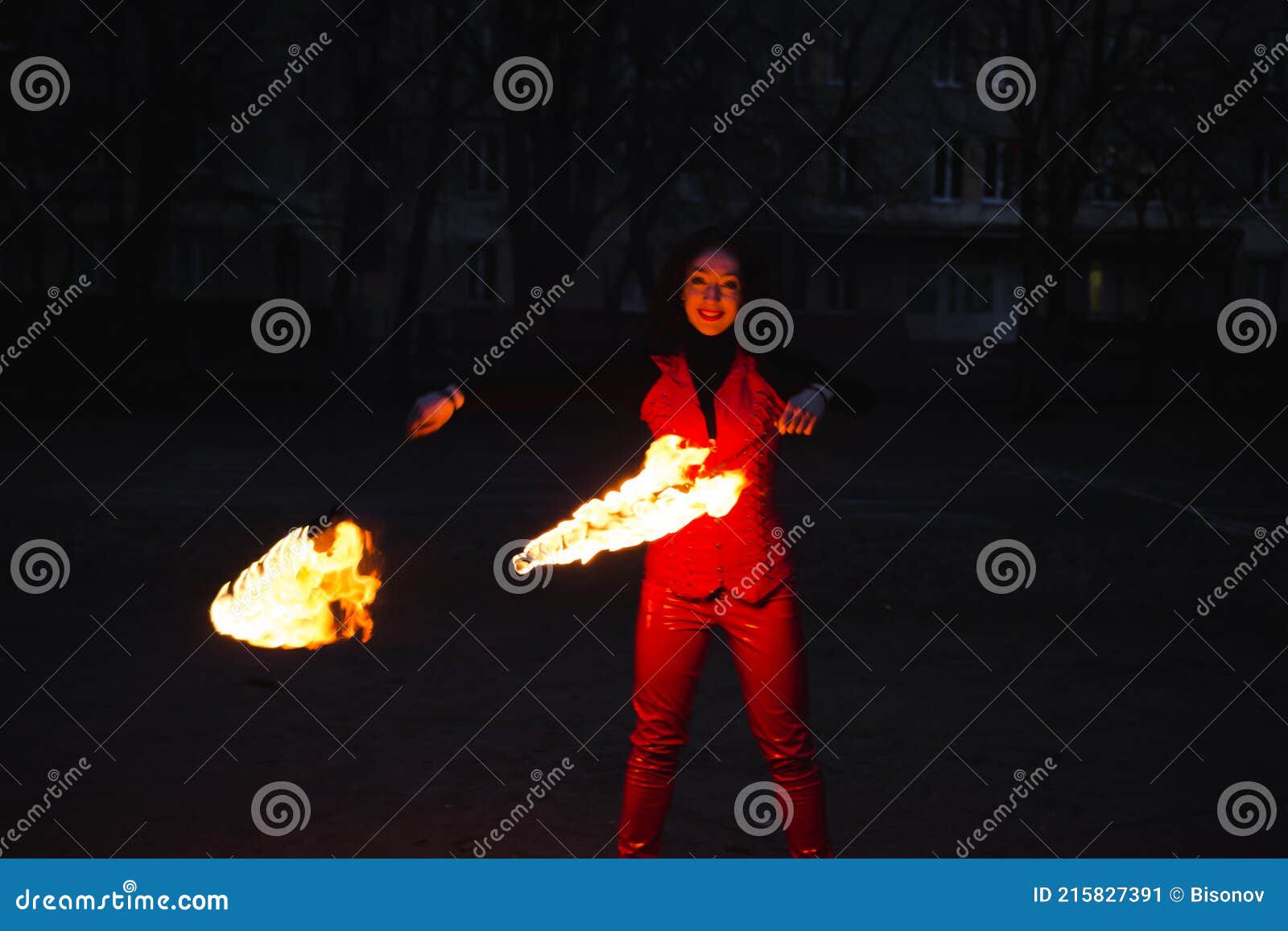 A girl shows a fire show stock image. Image of dance - 215827391