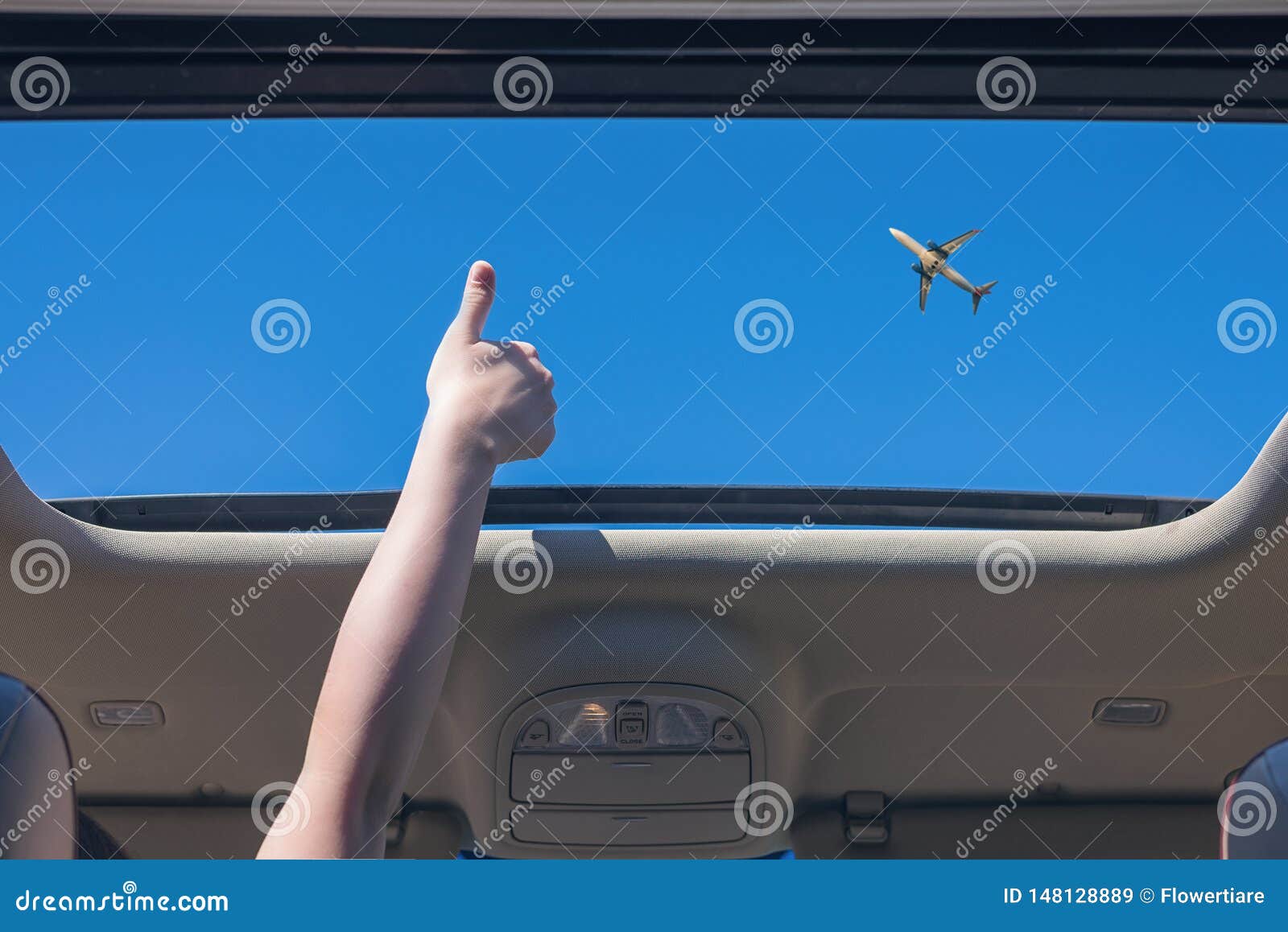 Girl Shows Her Finger on the Airplane in Open Hatch of a Vehicle. Stock ... Girl Shows Her Finger on the Airplane in Open Hatch of a Vehicle. Stock ...