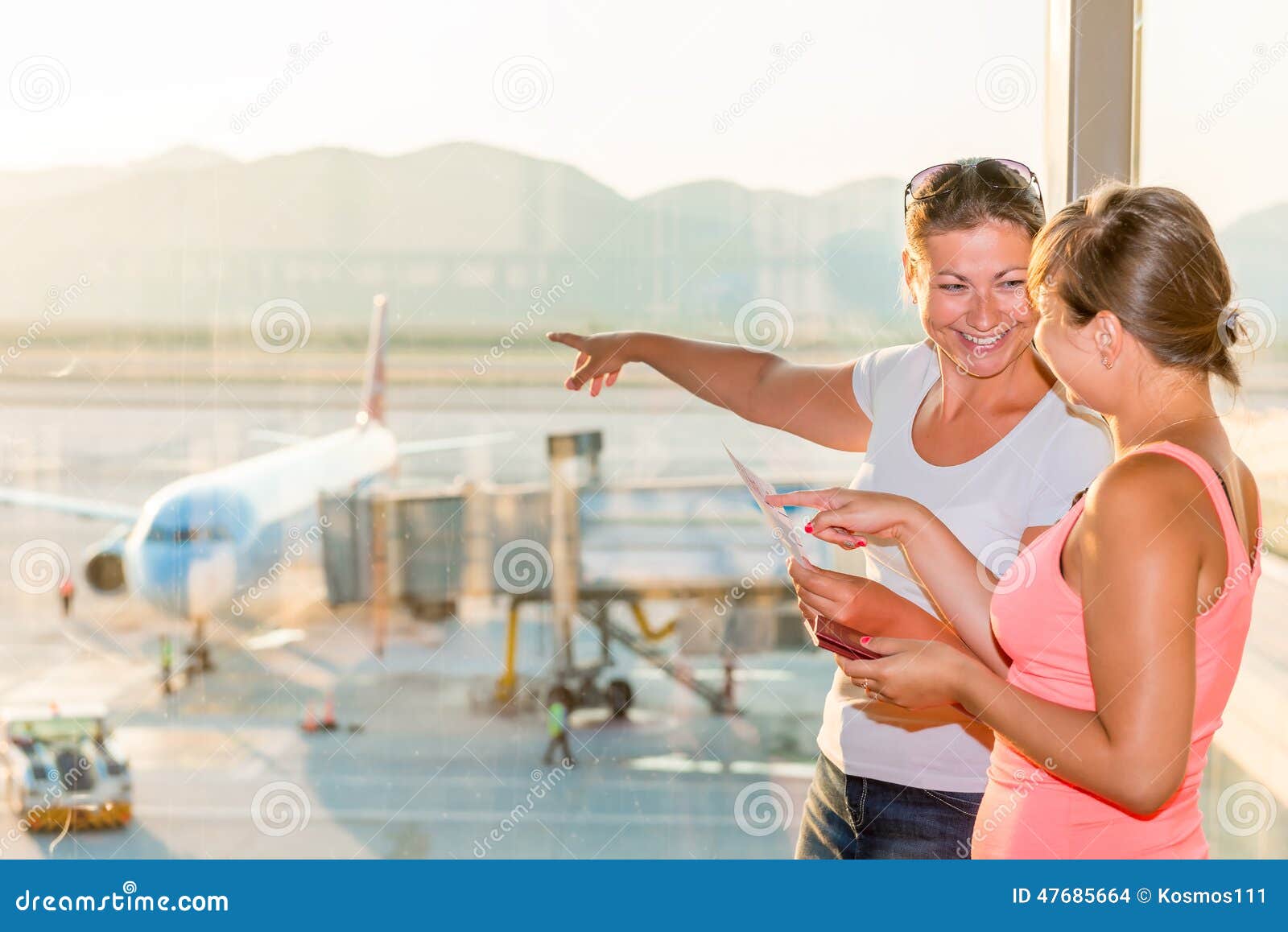 Girl Shows Her Friend a Plane Stock Photo - Image of comfortable ...