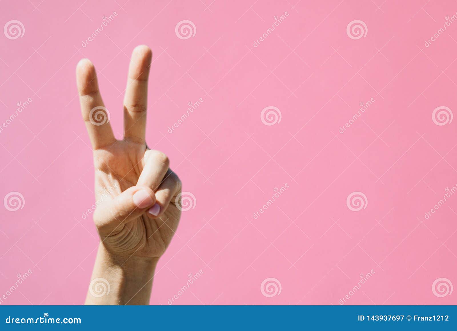 Girl shows peace sign stock image. Image of background - 143937697