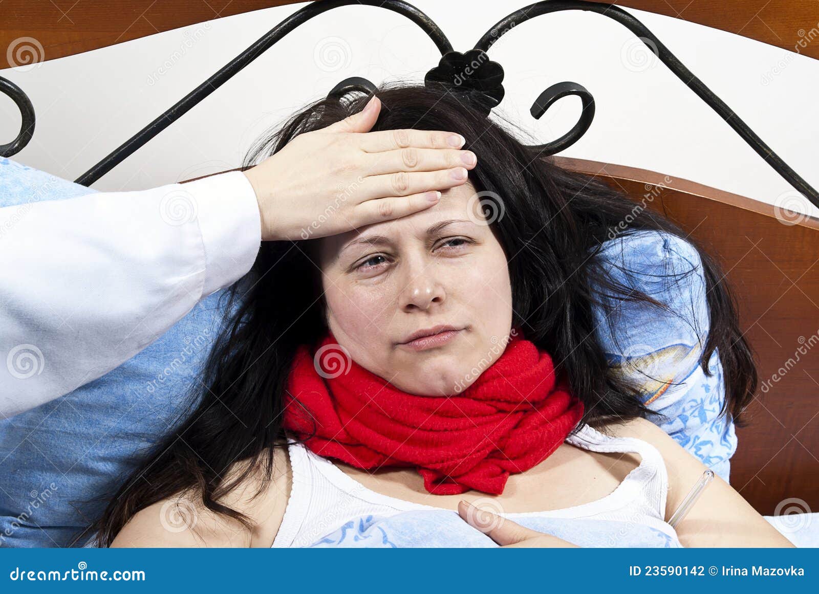 The girl is sick, and lies stock photo. Image of home - 23590142