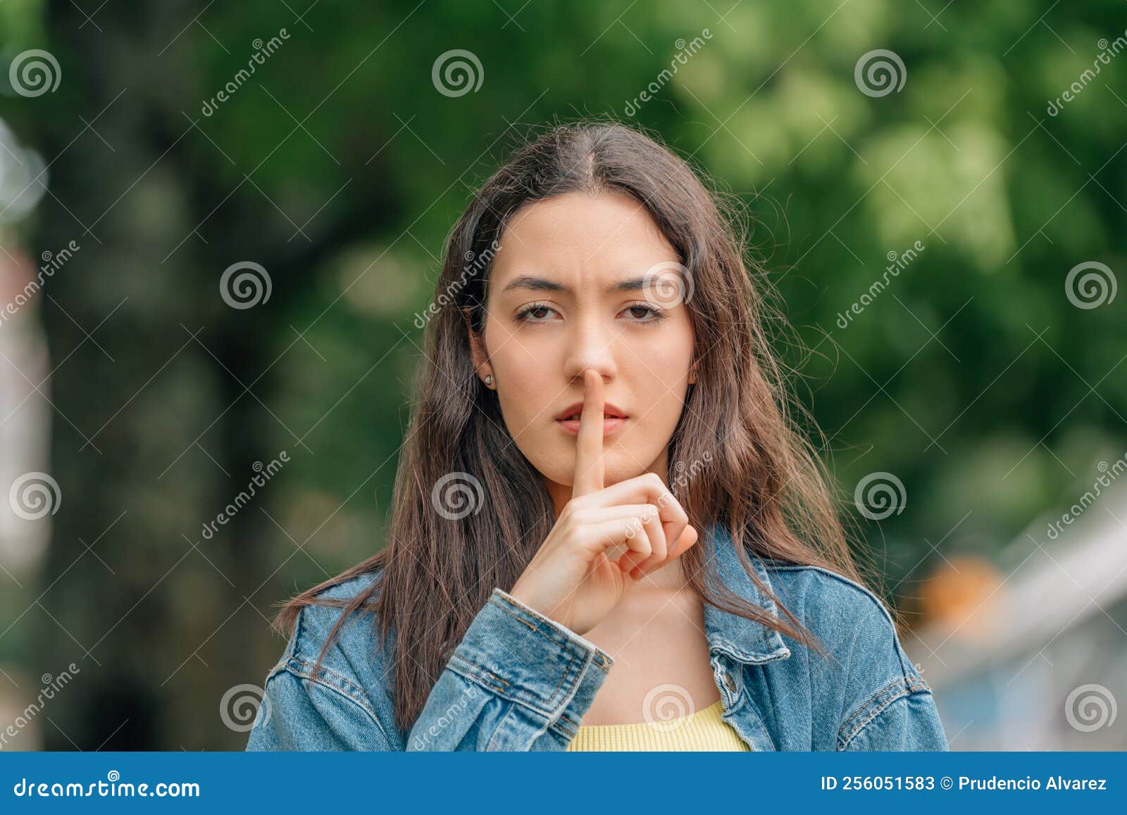 Girl with silence sign stock image. Image of young, sign - 256051583