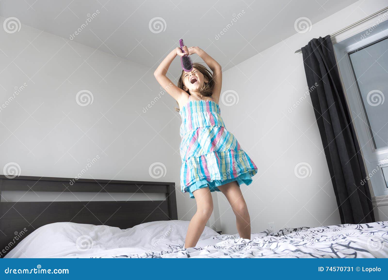 Girl singer in the bedroom stock image. Image of ladies - 74570731