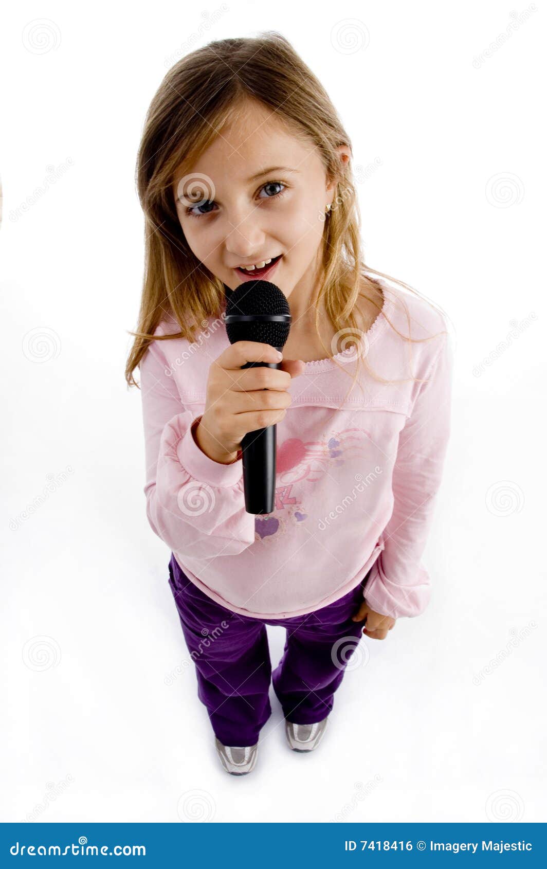 Girl Singing into Microphone Stock Photo - Image of childhood, sound ...