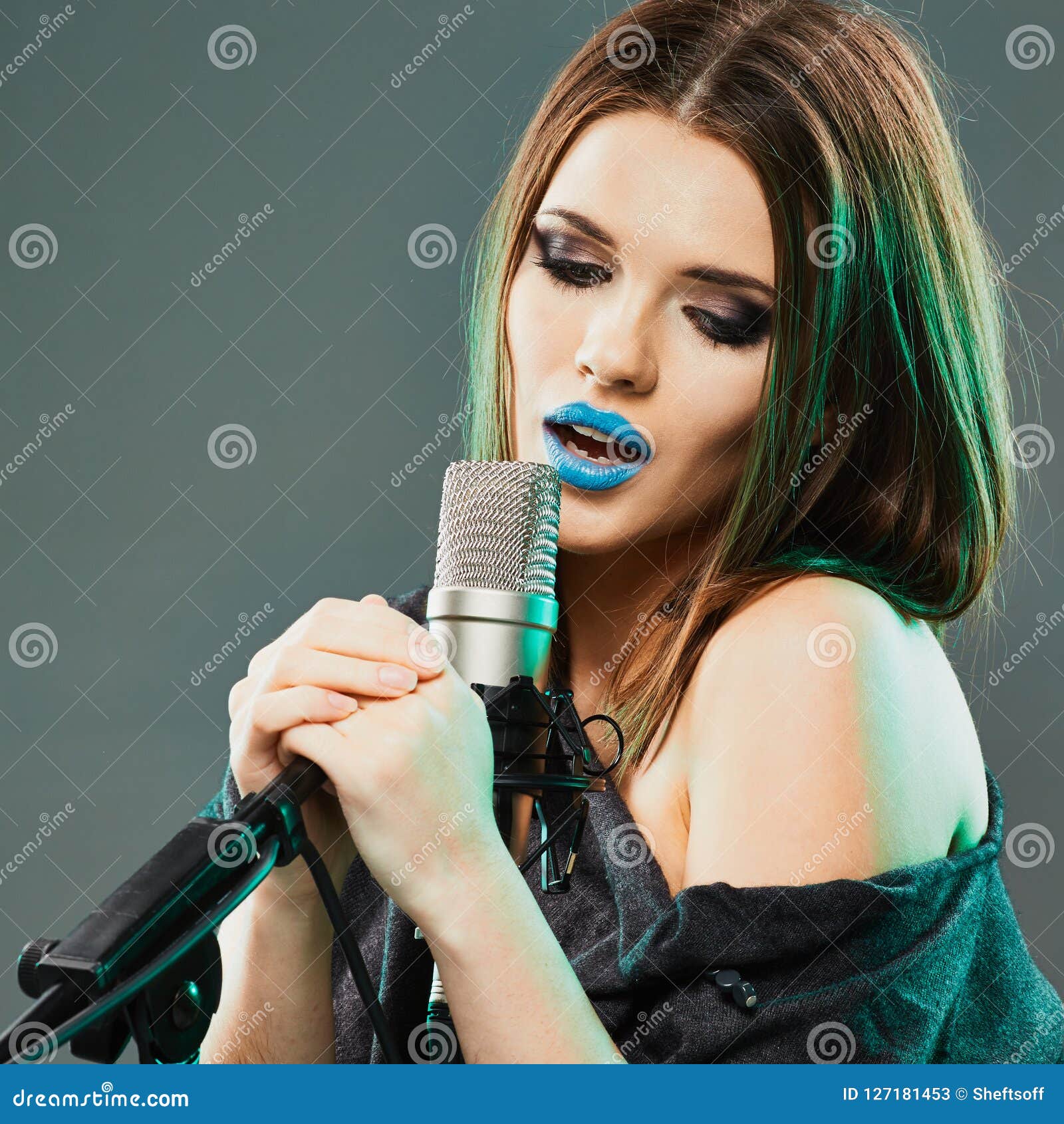 Girl Singing into a Microphone. Stock Image - Image of beauty, face ...