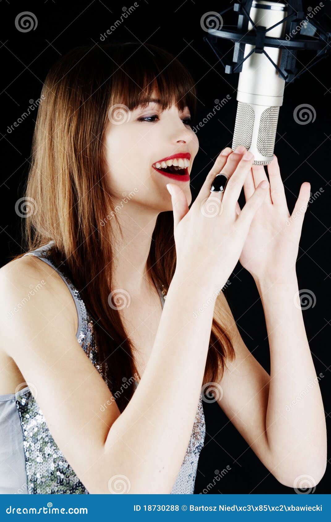 Girl Singing To the Microphone in a Studio Stock Photo - Image of ...