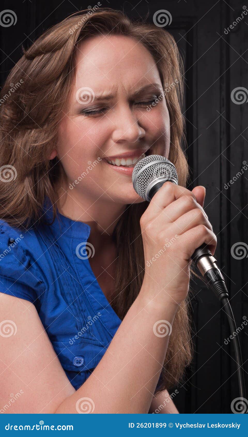 Girl Singing To The Microphone In A Studio Stock Image - Image of ...