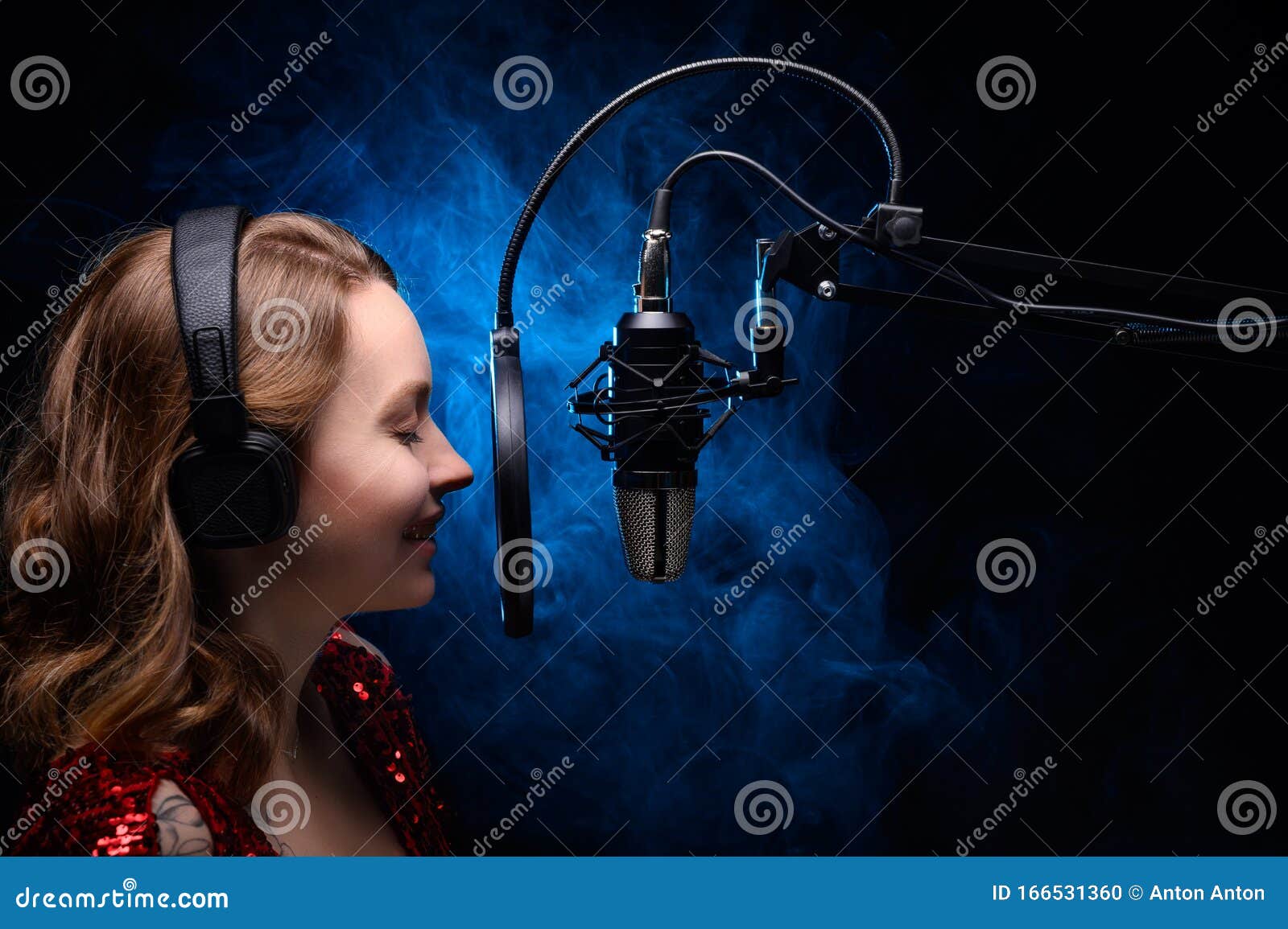 Girl Singer Sings into a Microphone, with a Spectacular Background ...