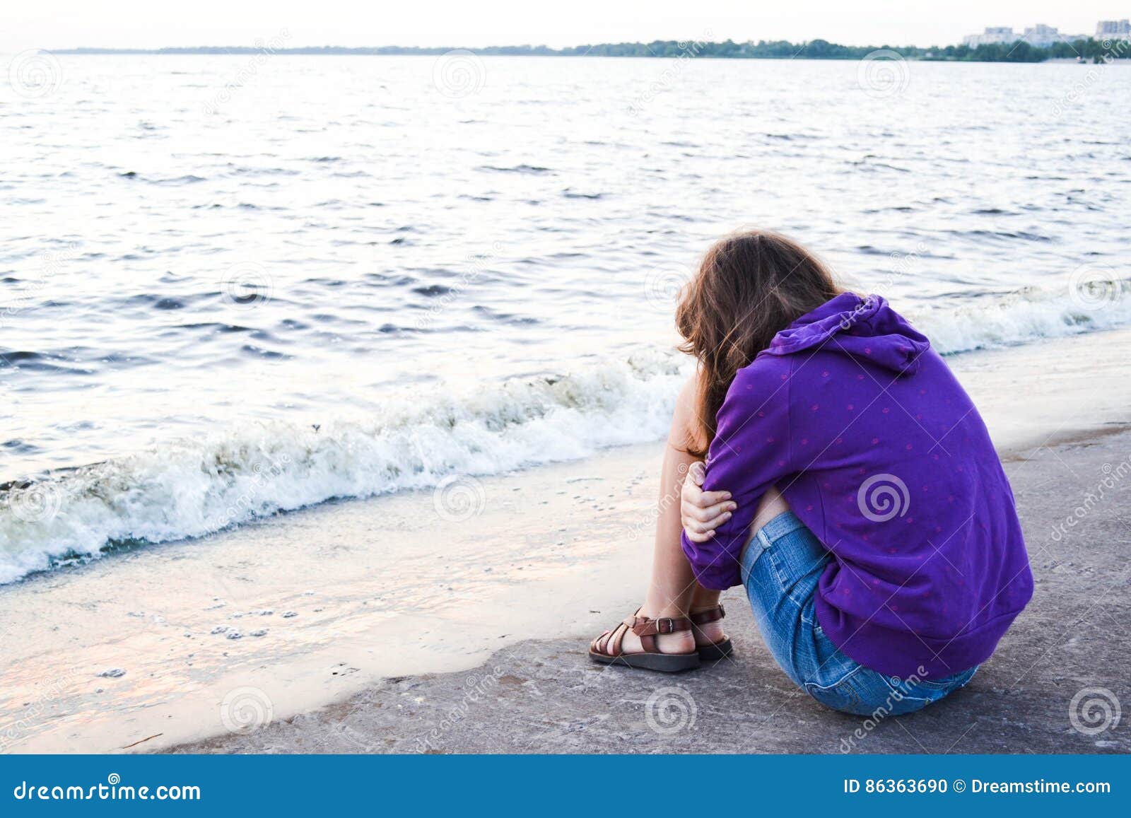Girl siting at riverside stock photo. Image of outside - 86363690