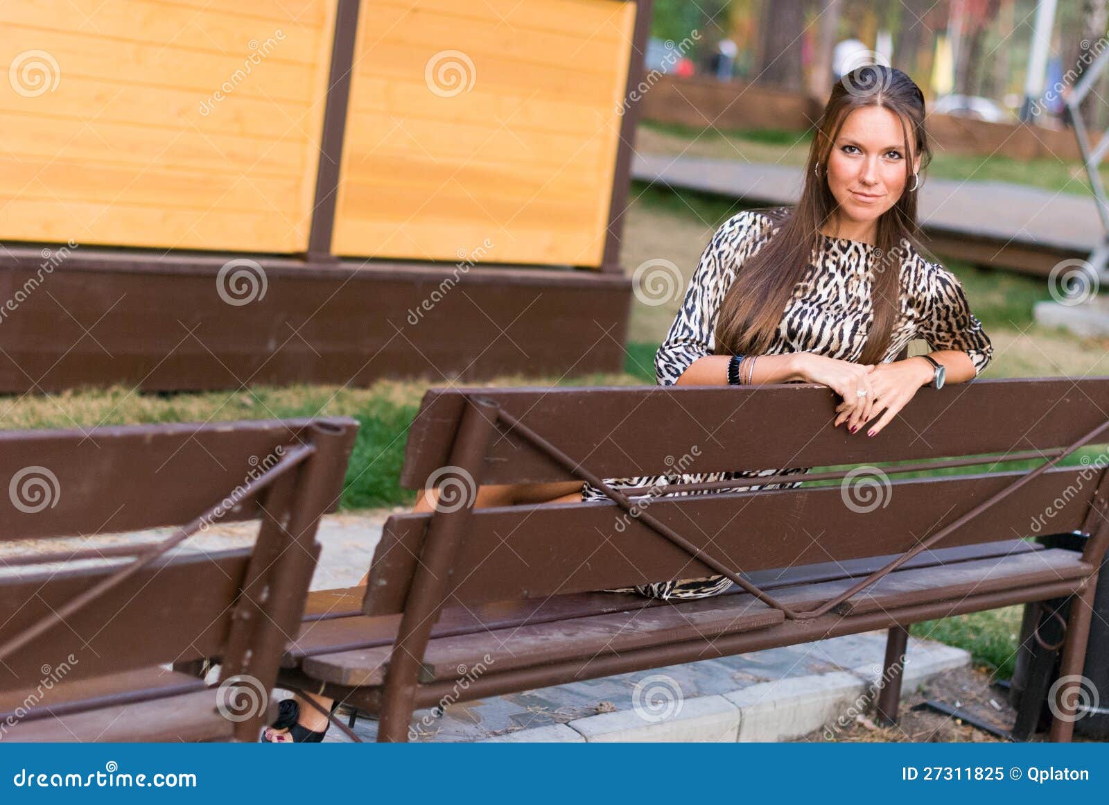 Girl sits on a bench stock image. Image of beauty, heat - 27311825