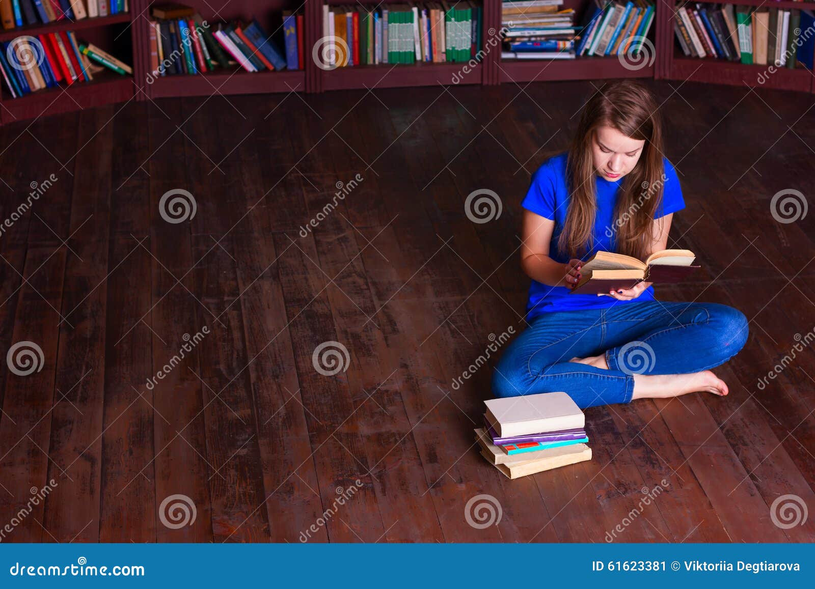 Girl Sits on Floor in the Library Stock Image - Image of technology ...