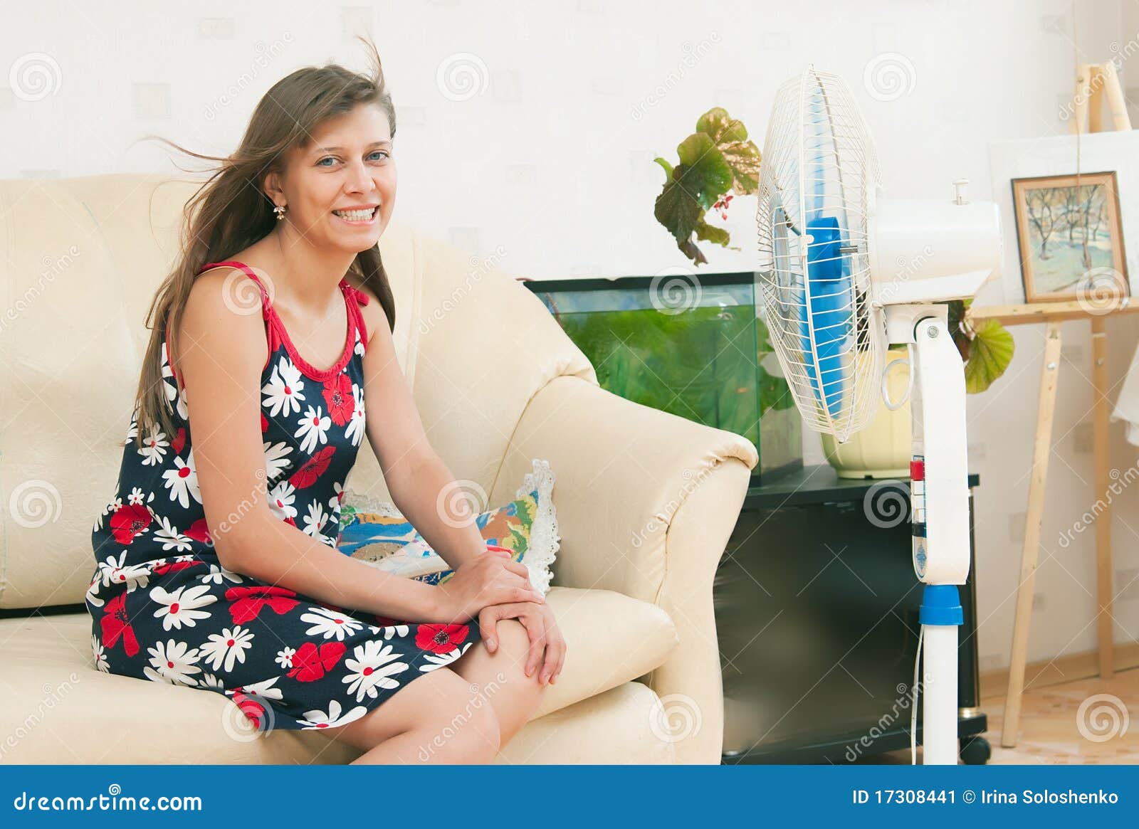 The Girl Sits in Front of the Fan Stock Image - Image of woman, smiles ...