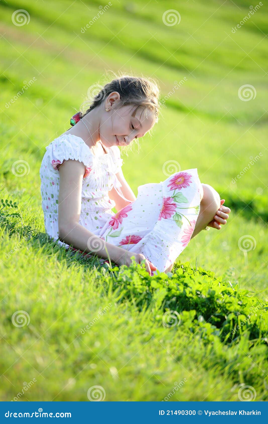 Girl sits on a grass stock photo. Image of street, happy - 21490300