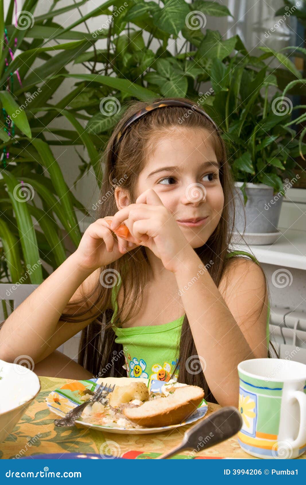 The Girl Sits at a Table with Meal and Eats Stock Photo - Image of girl ...