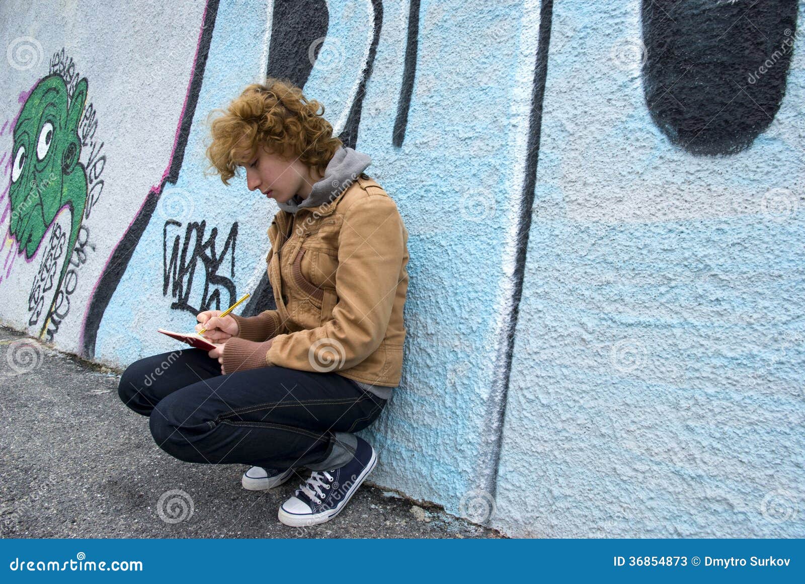Girl Sitting Against a Wall Editorial Stock Photo - Image of outdoors ...