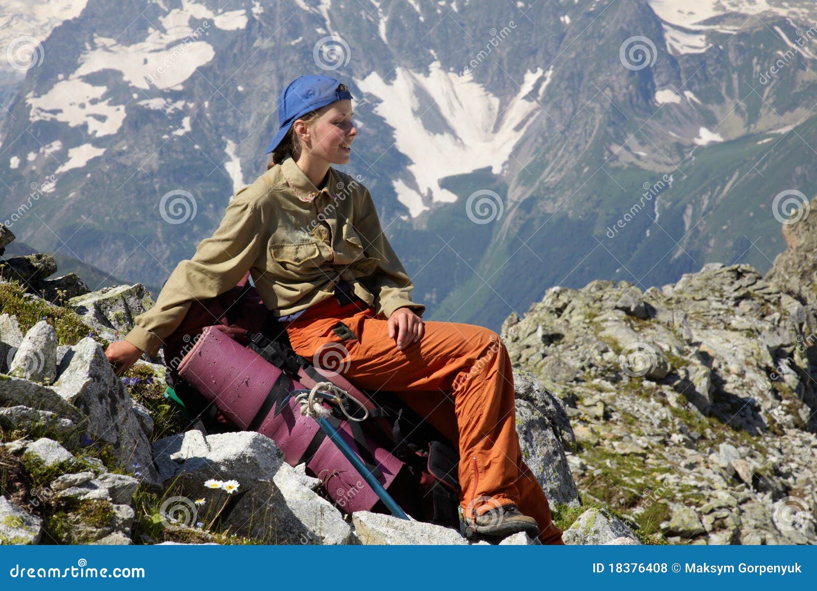 Girl Sitting on the Backpack Stock Photo - Image of outdoor, backpack ...