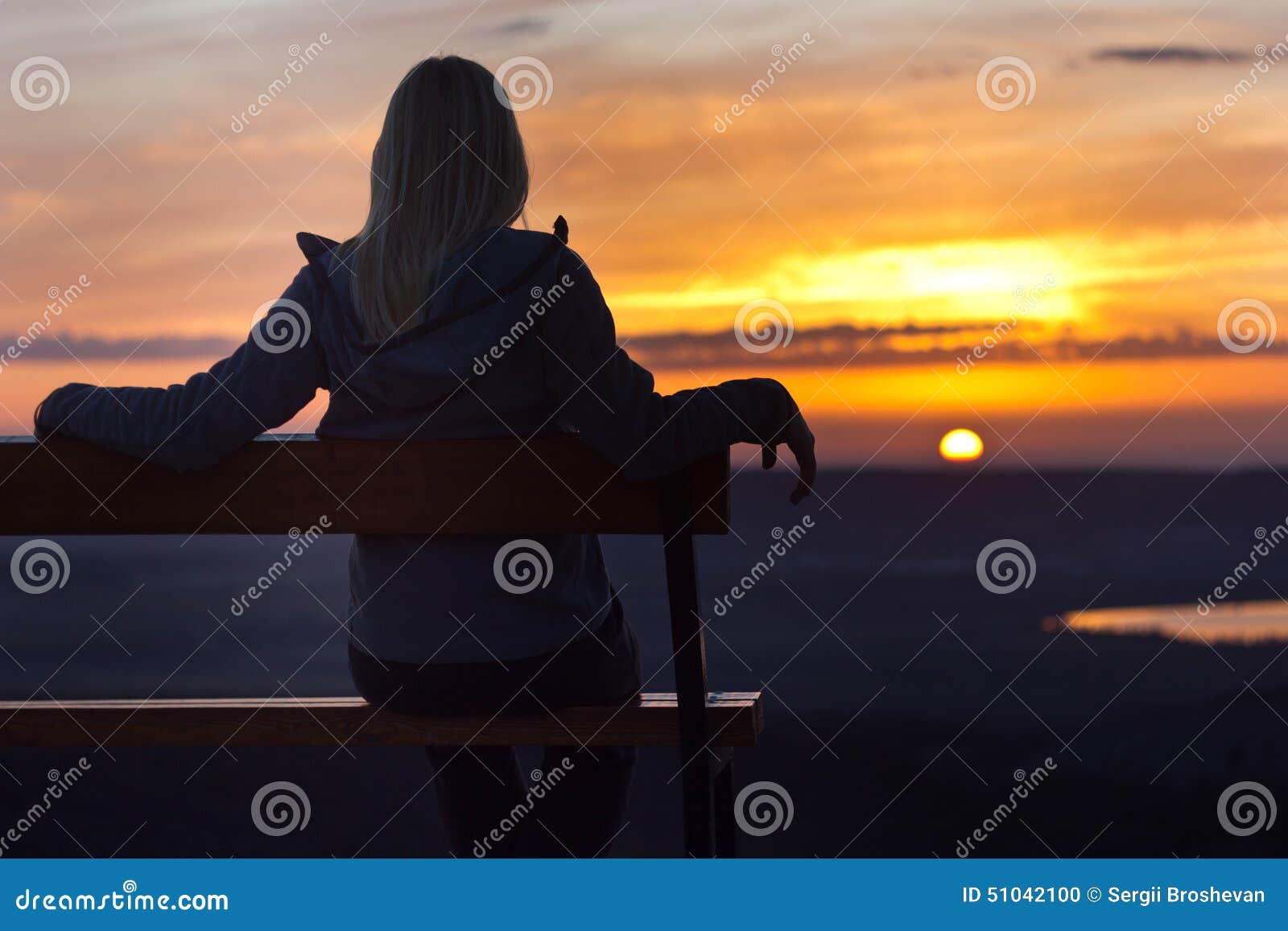 Girl Sitting on a Banch at Sunset Stock Photo - Image of relax, sitting ...