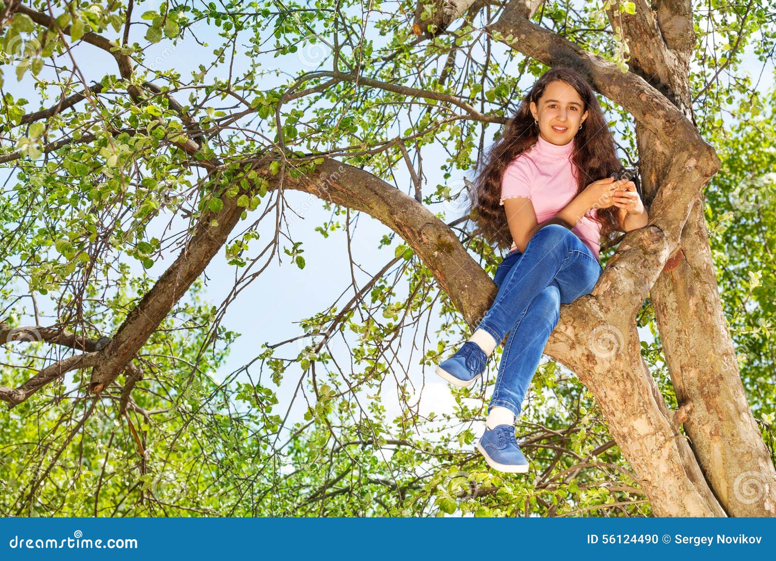 Girl Sitting on the Bench of Tree in Forest Alone Stock Photo - Image ...