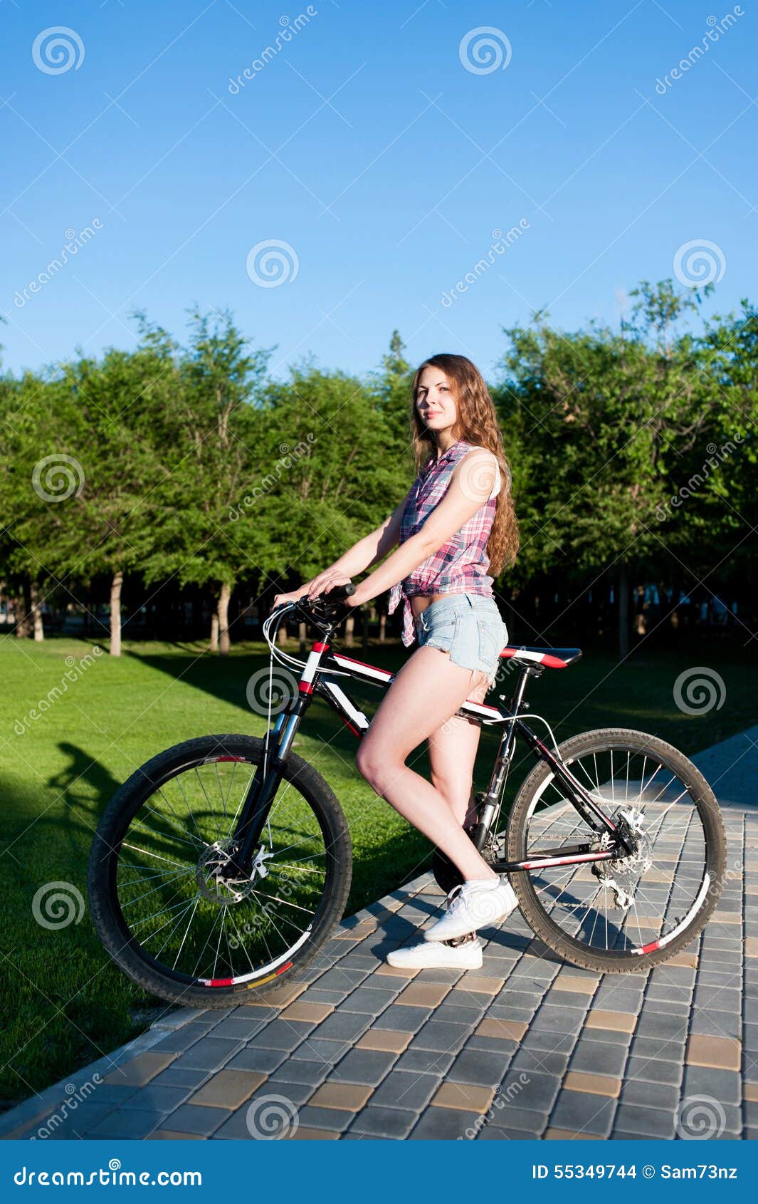 Girl sitting on bicycle stock photo. Image of lifestyle - 55349744
