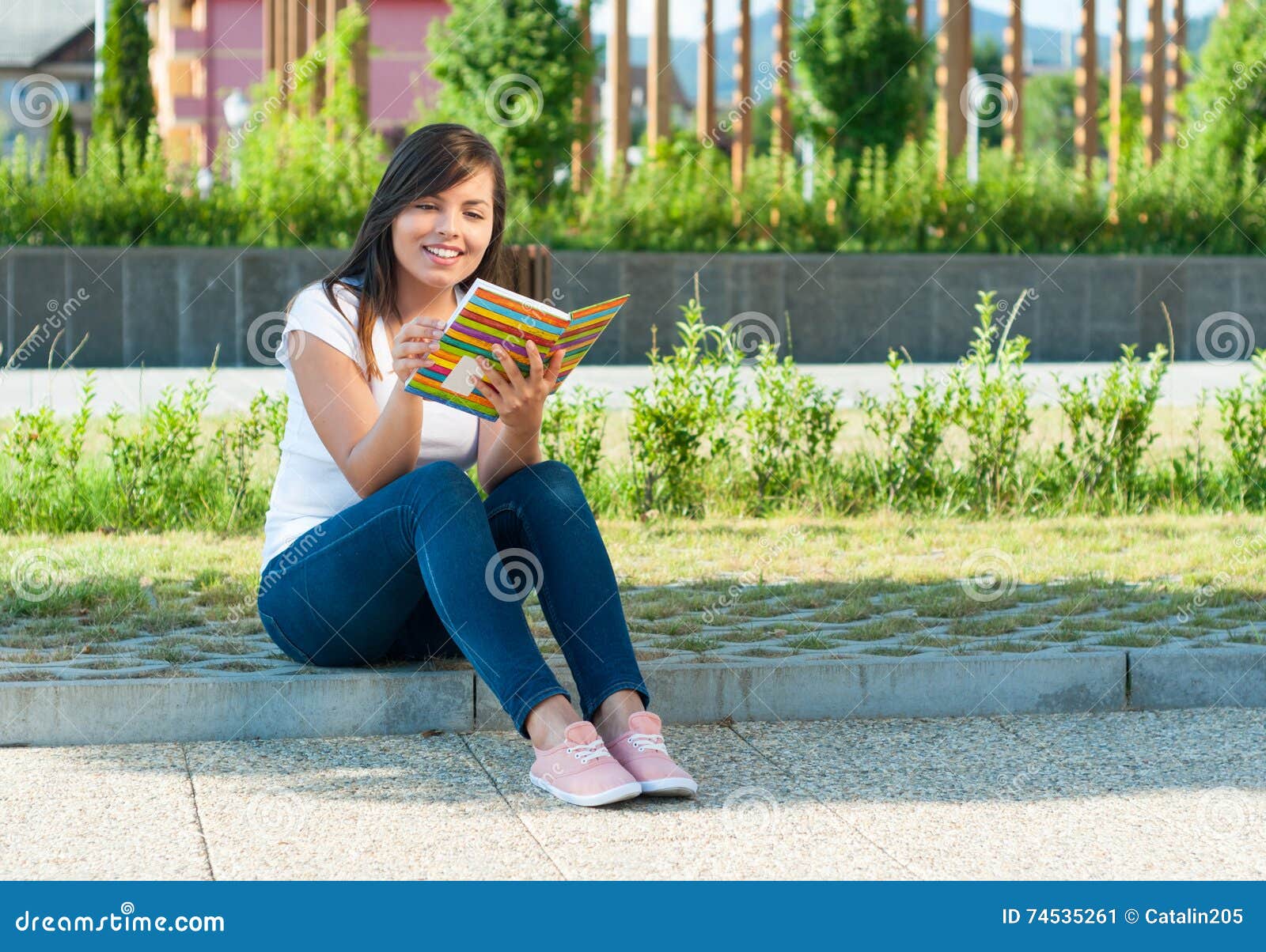 Girl Sitting Down and Reading from Notebook or Diary Stock Image ...