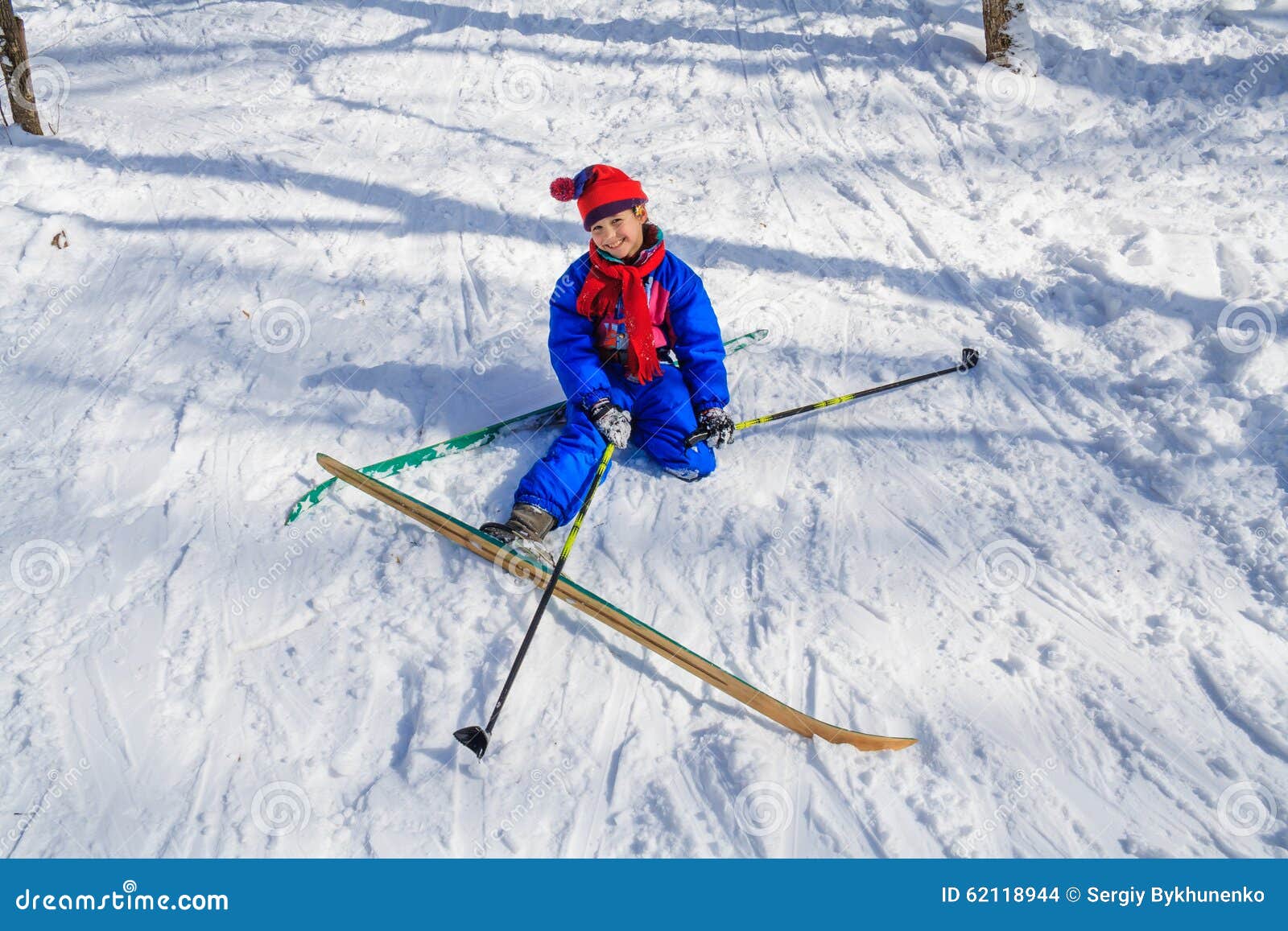 Girl Sitting Down on the Snow Learning Skiing Stock Photo - Image of ...