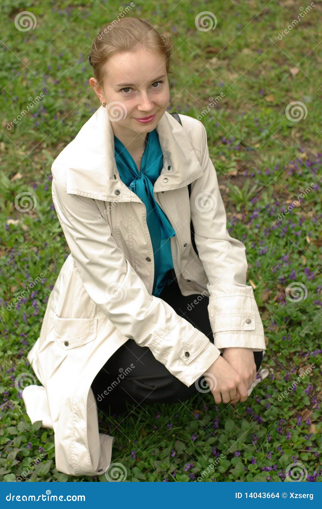 A Girl Sitting on the Field Stock Photo - Image of light, grass: 14043664
